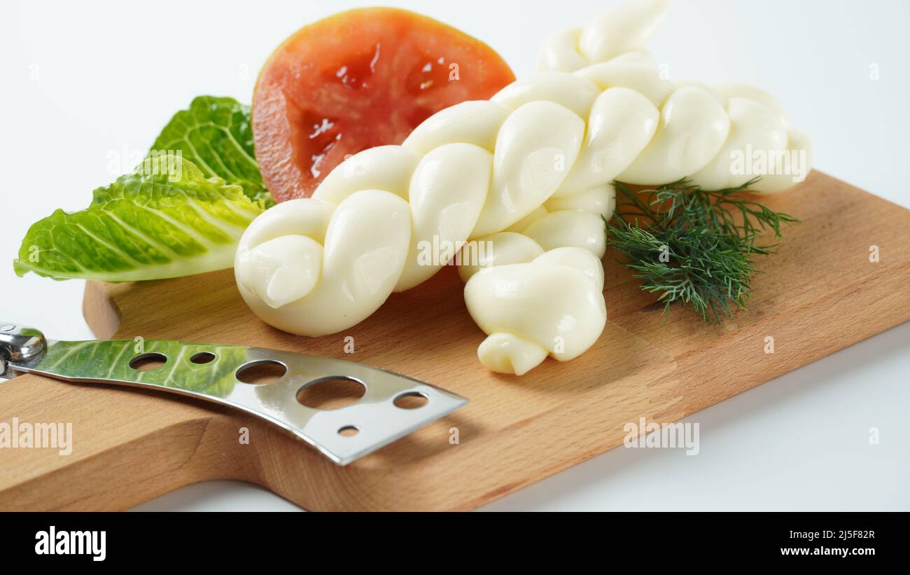 Turkish Knitting, Knitted Cheese on Wooden Board. Natural local cheeses ...
