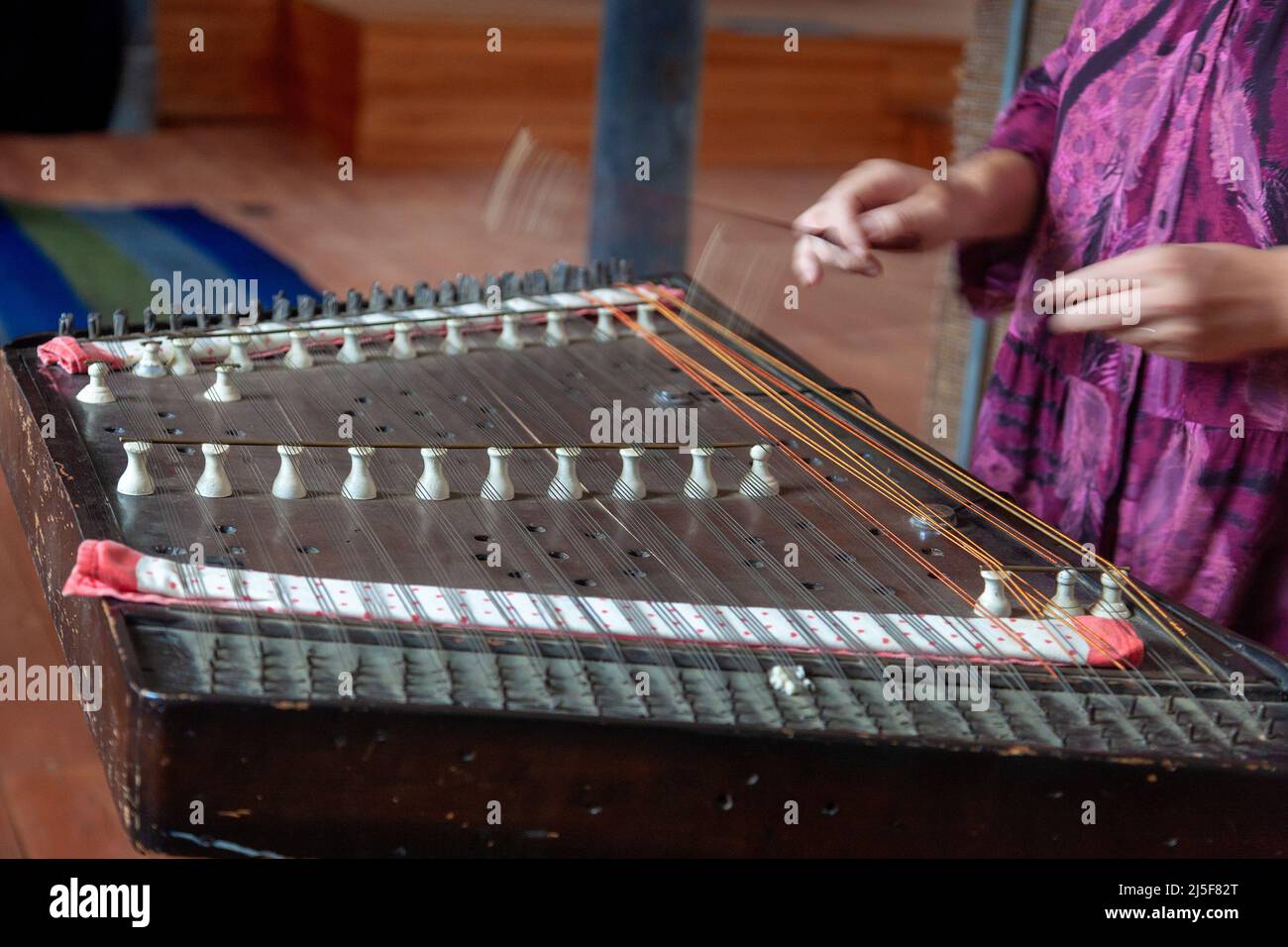 The cimbalom instrument played by a musician Stock Photo - Alamy