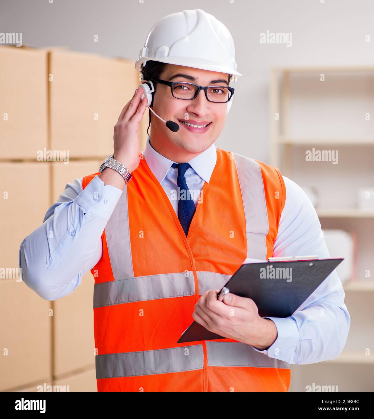 The man working in postal parcel delivery service office Stock Photo ...