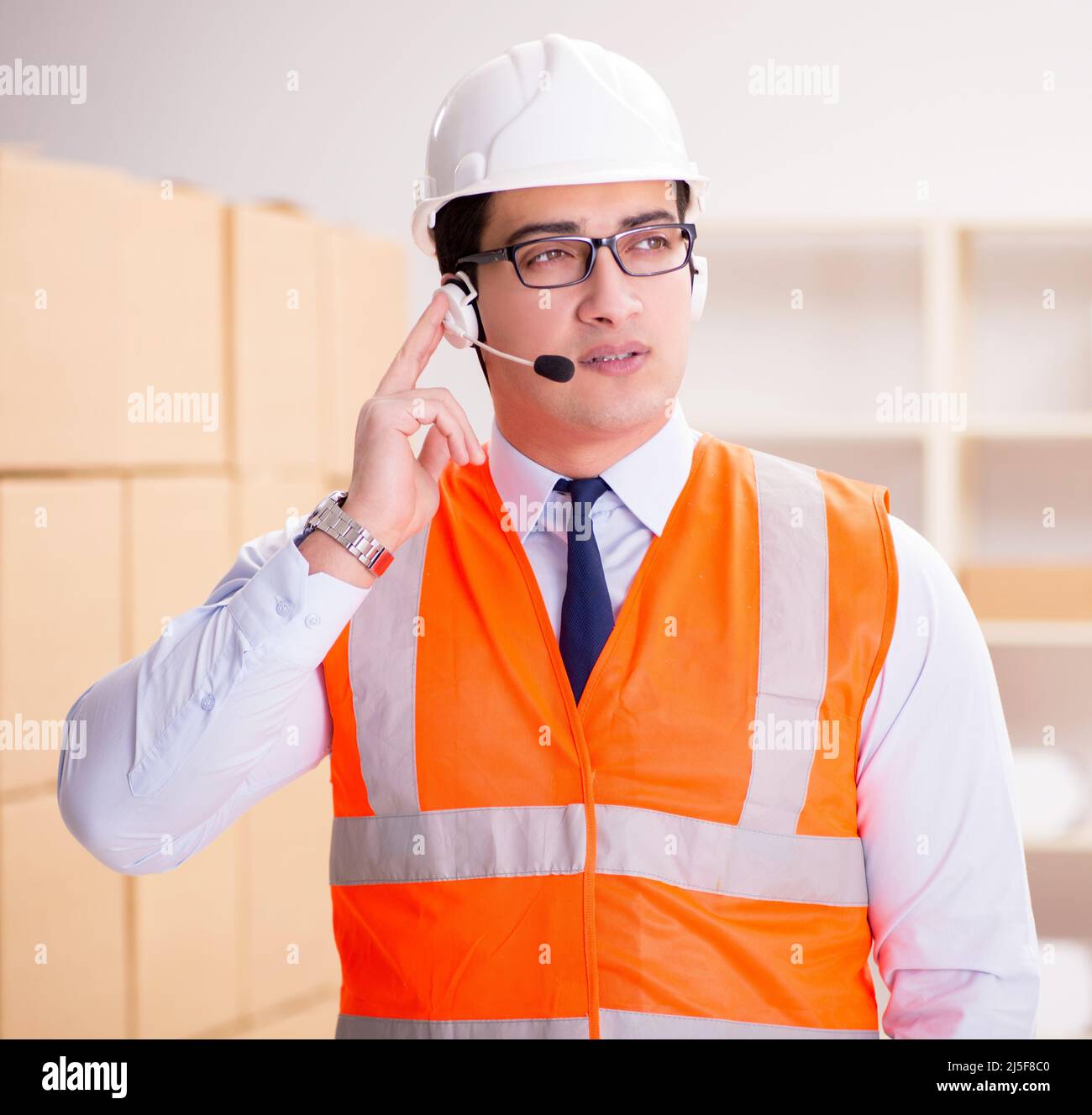 The man working in postal parcel delivery service office Stock Photo ...