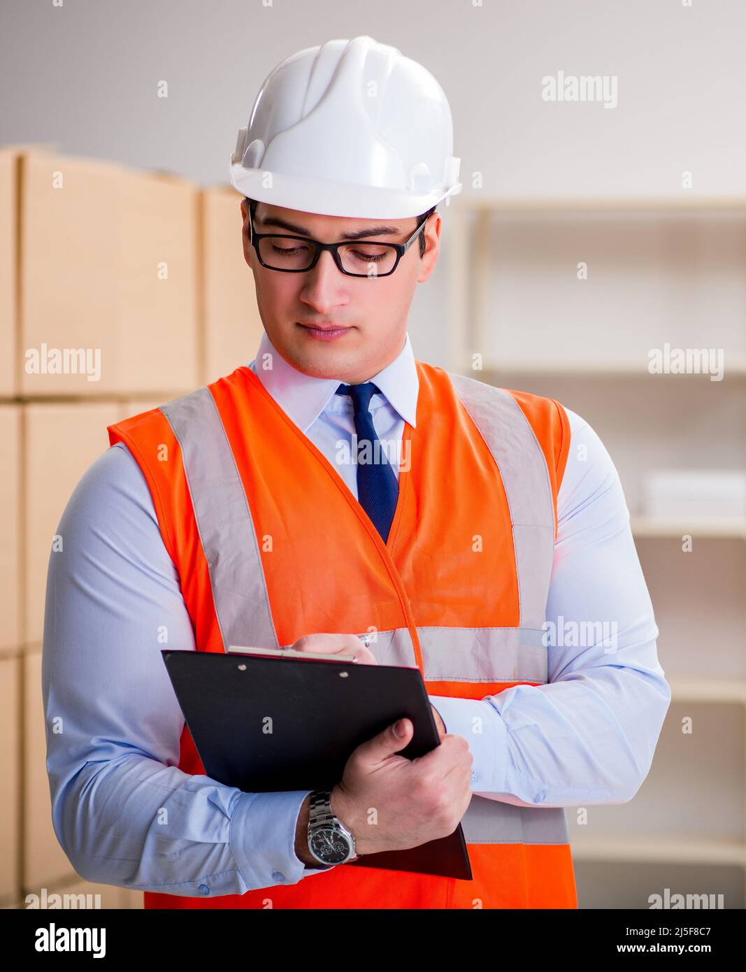 The man working in postal parcel delivery service office Stock Photo ...