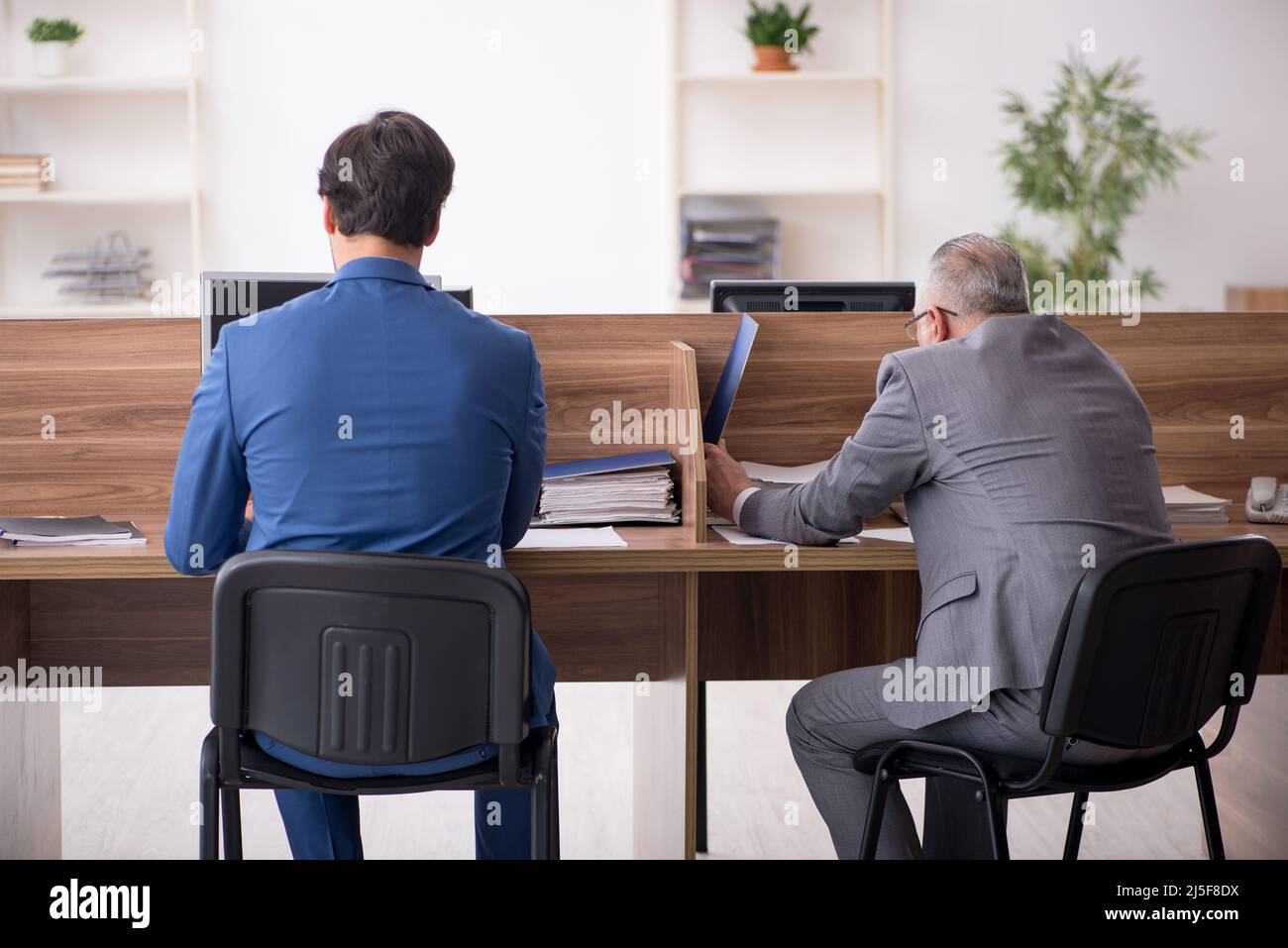 Rear view busy employees hi-res stock photography and images - Alamy