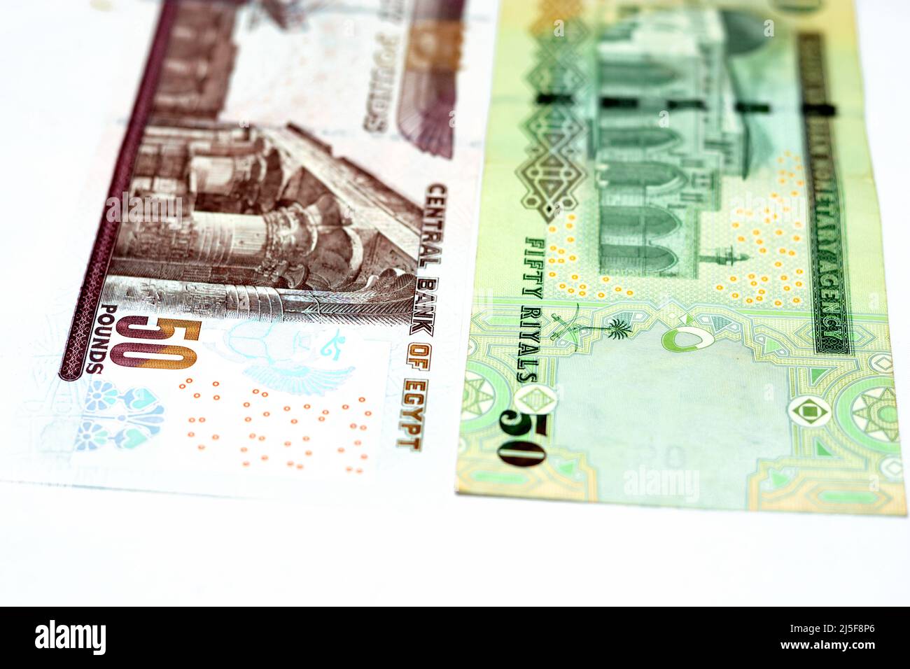 Reverse sides of old Saudi Arabia 50 fifty riyals banknote with 50 LE ...