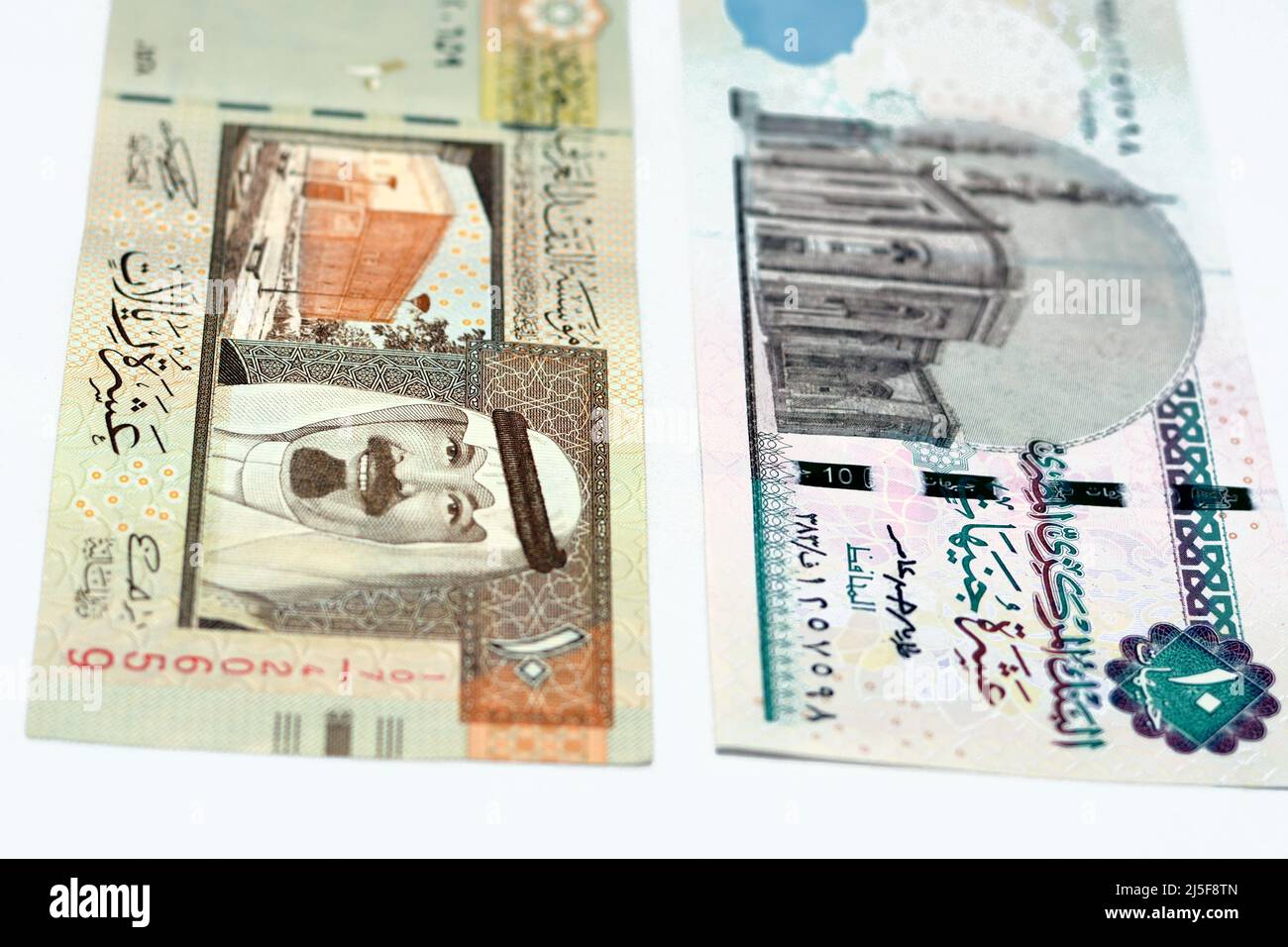 Obverse sides of an old Saudi Arabia 10 ten riyals banknote with 10 LE ...