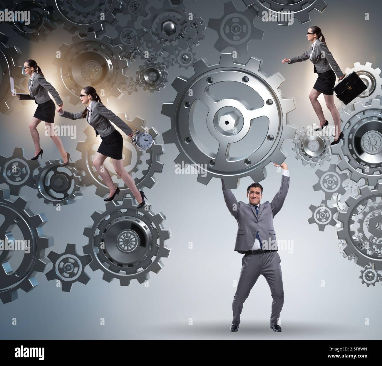 The businessman supporting gear in teamwork concept Stock Photo - Alamy