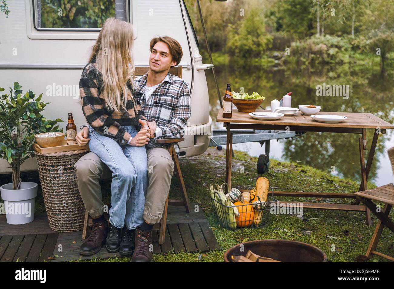 Young just married couple traveling in camper,house on wheels,trailer ...