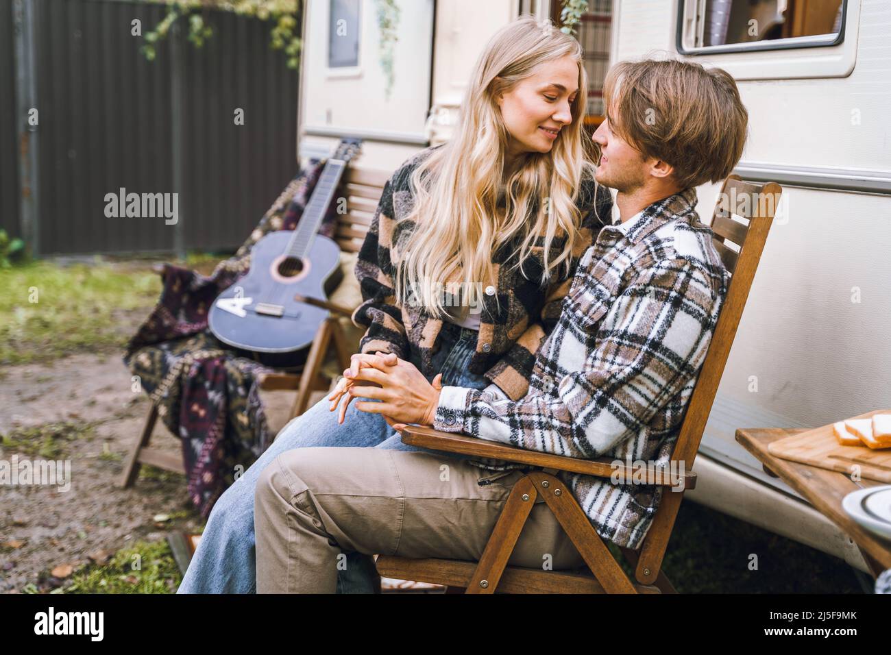 Young just married couple traveling in camper,house on wheels,trailer ...
