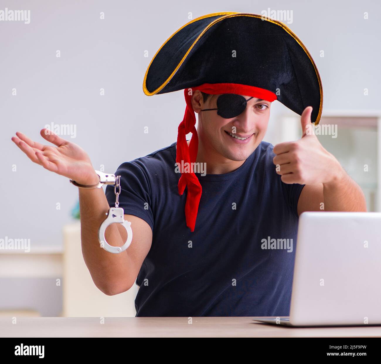 The digital security concept with pirate at computer Stock Photo - Alamy