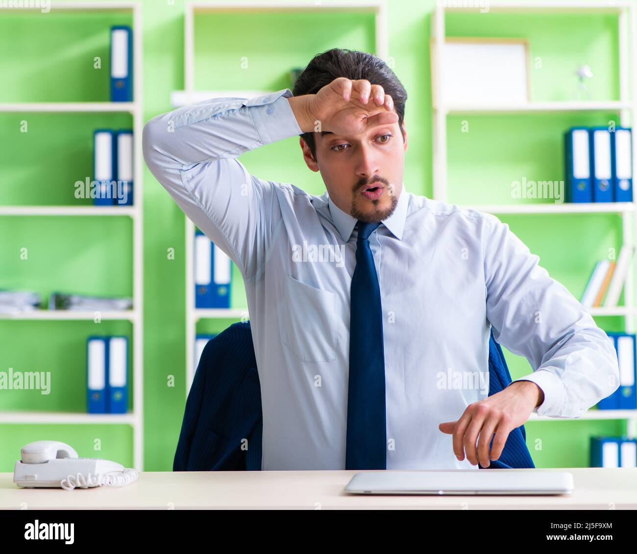 The employee doing exercises during break at work Stock Photo - Alamy