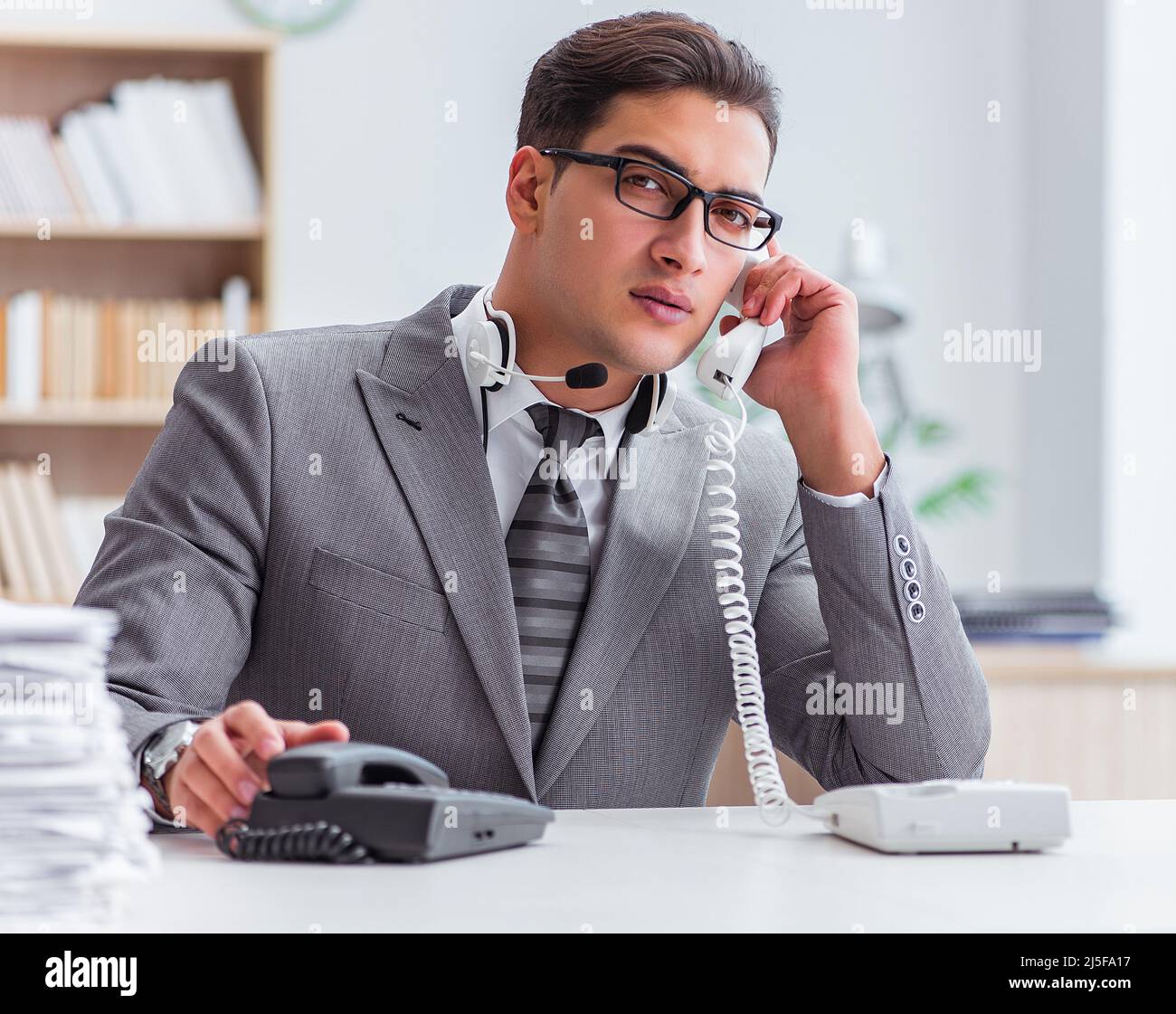 The call center operator talking on the phone Stock Photo - Alamy