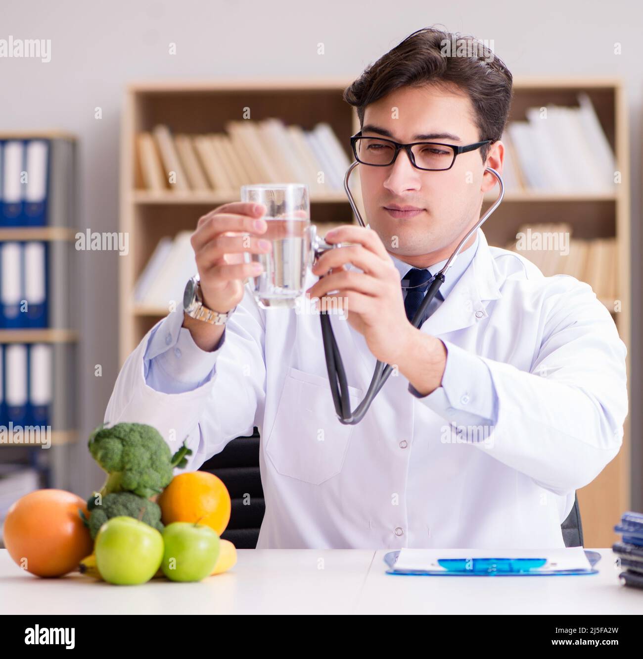 The doctor checking the quality of the water Stock Photo - Alamy