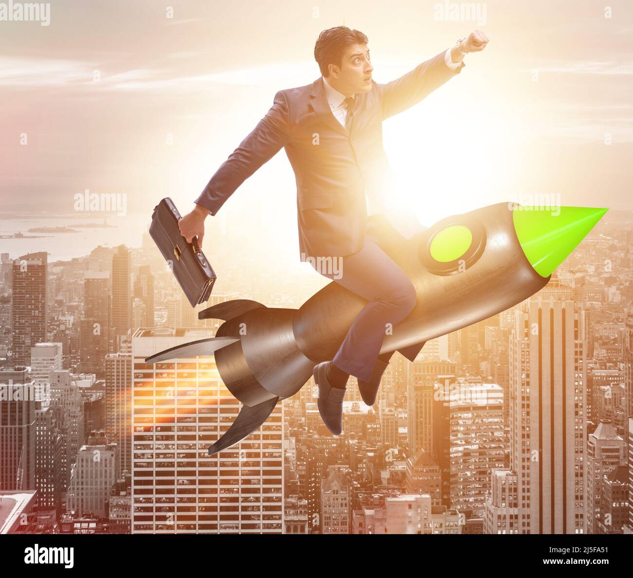 The male businessman flying on rocket in business concept Stock Photo ...
