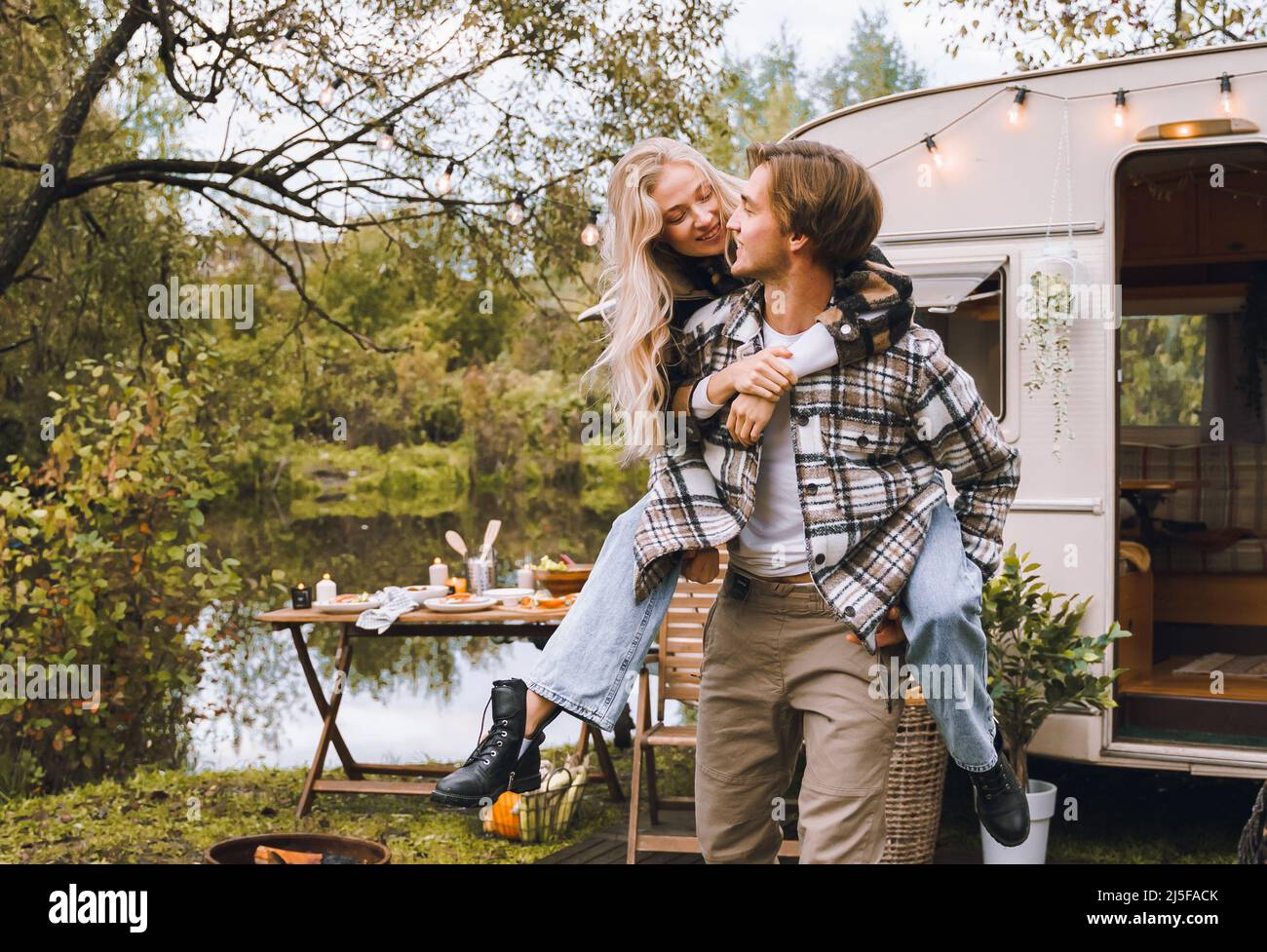 Young just married couple traveling in camper,house on wheels,trailer ...