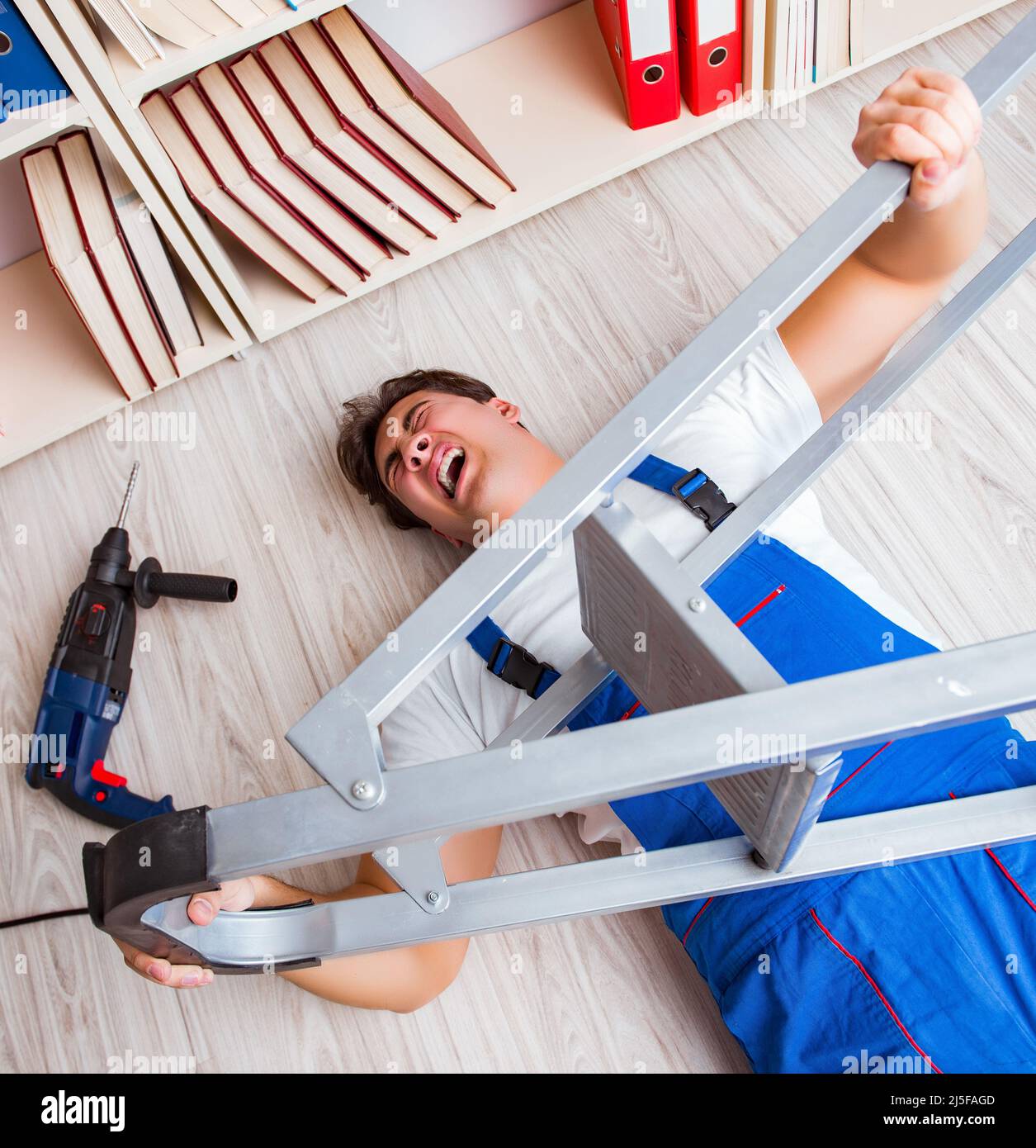 The unsafe behavior concept with falling worker Stock Photo - Alamy