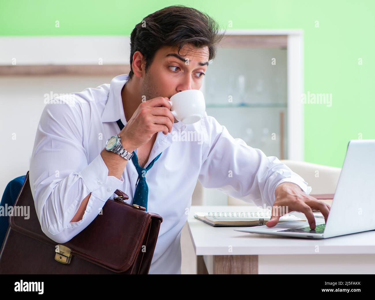 The man dressing up and late for work Stock Photo - Alamy