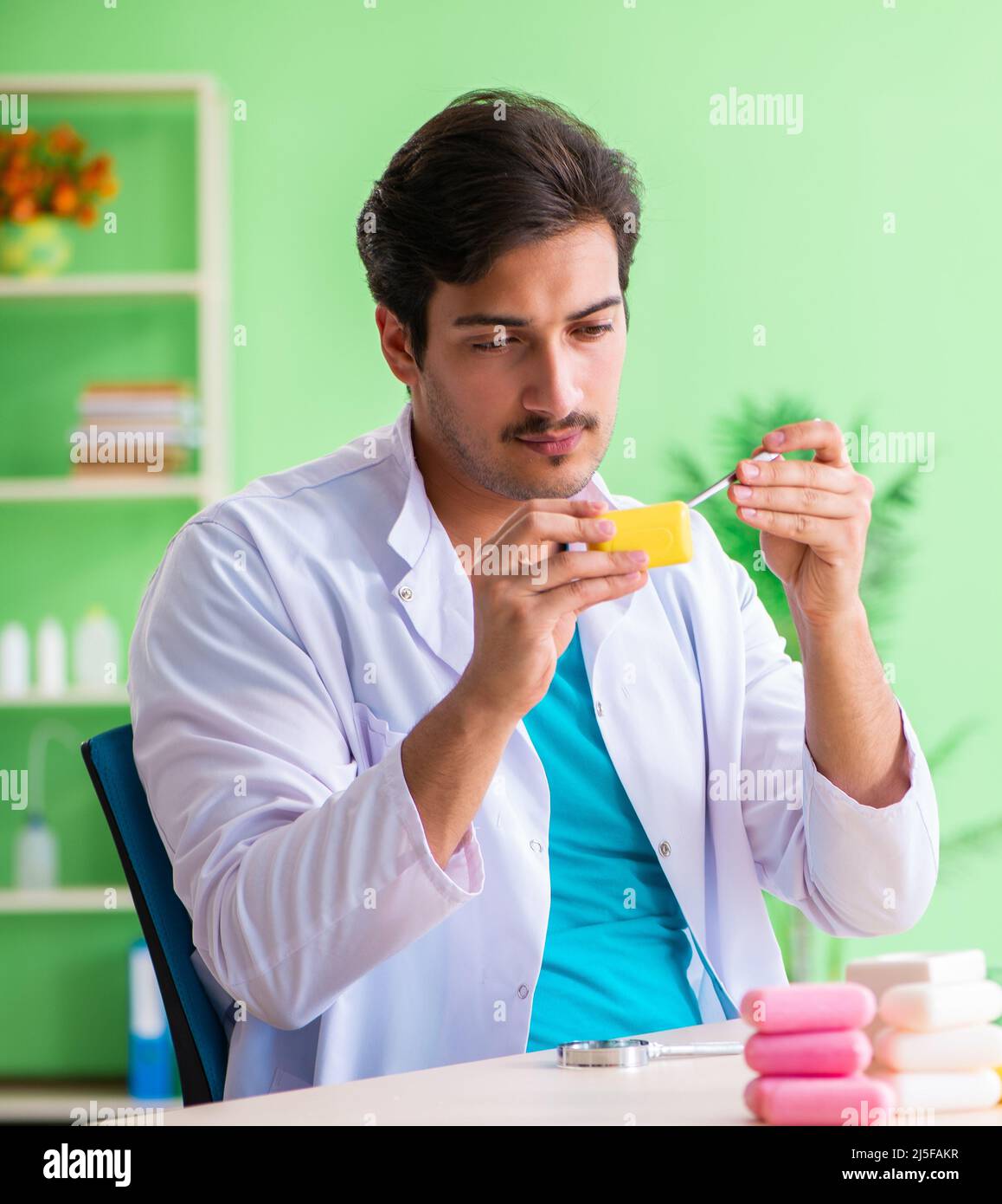 The chemist testing soap in the lab Stock Photo - Alamy