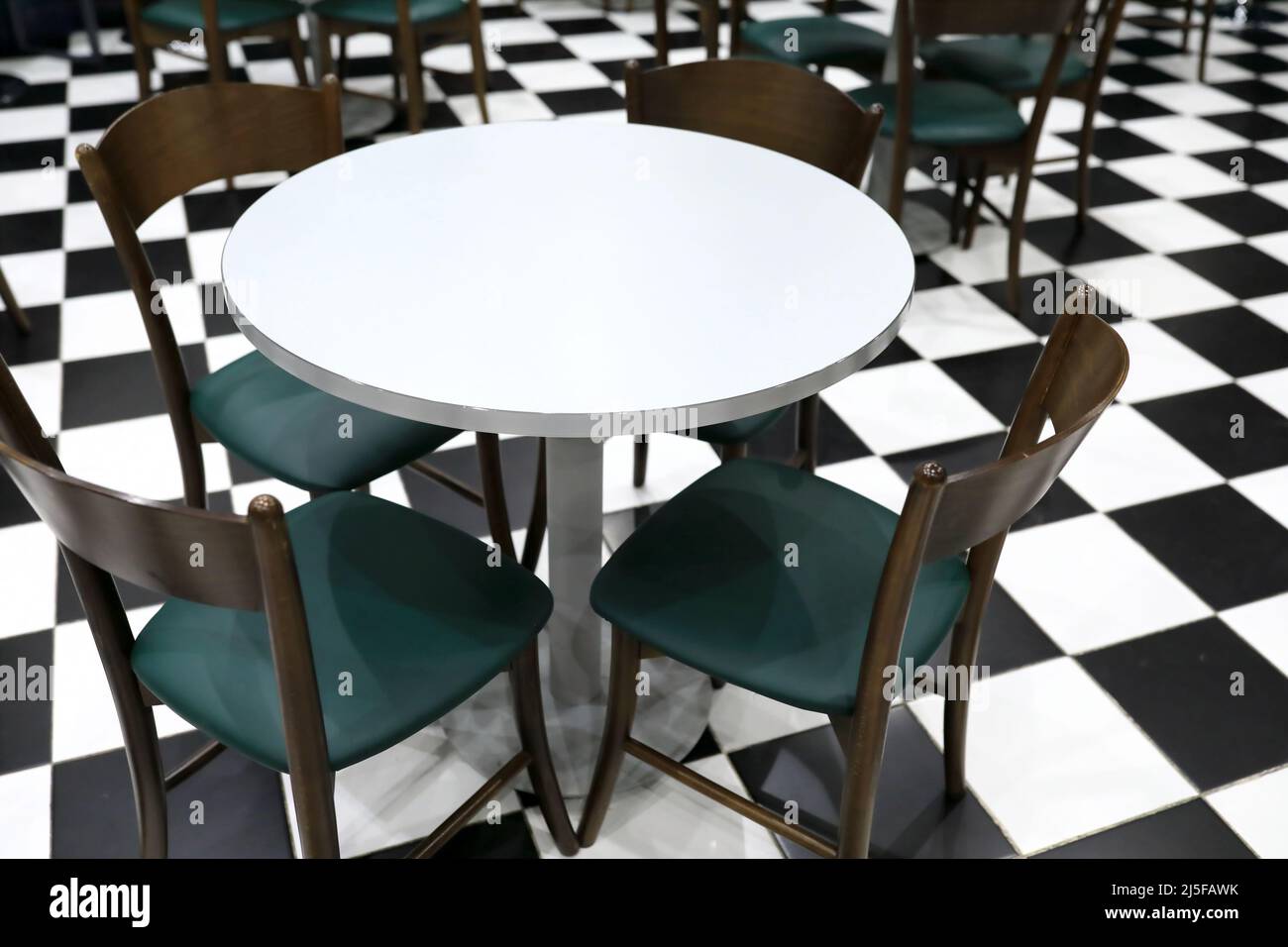 Interior of empty restaurant in the evening Stock Photo - Alamy