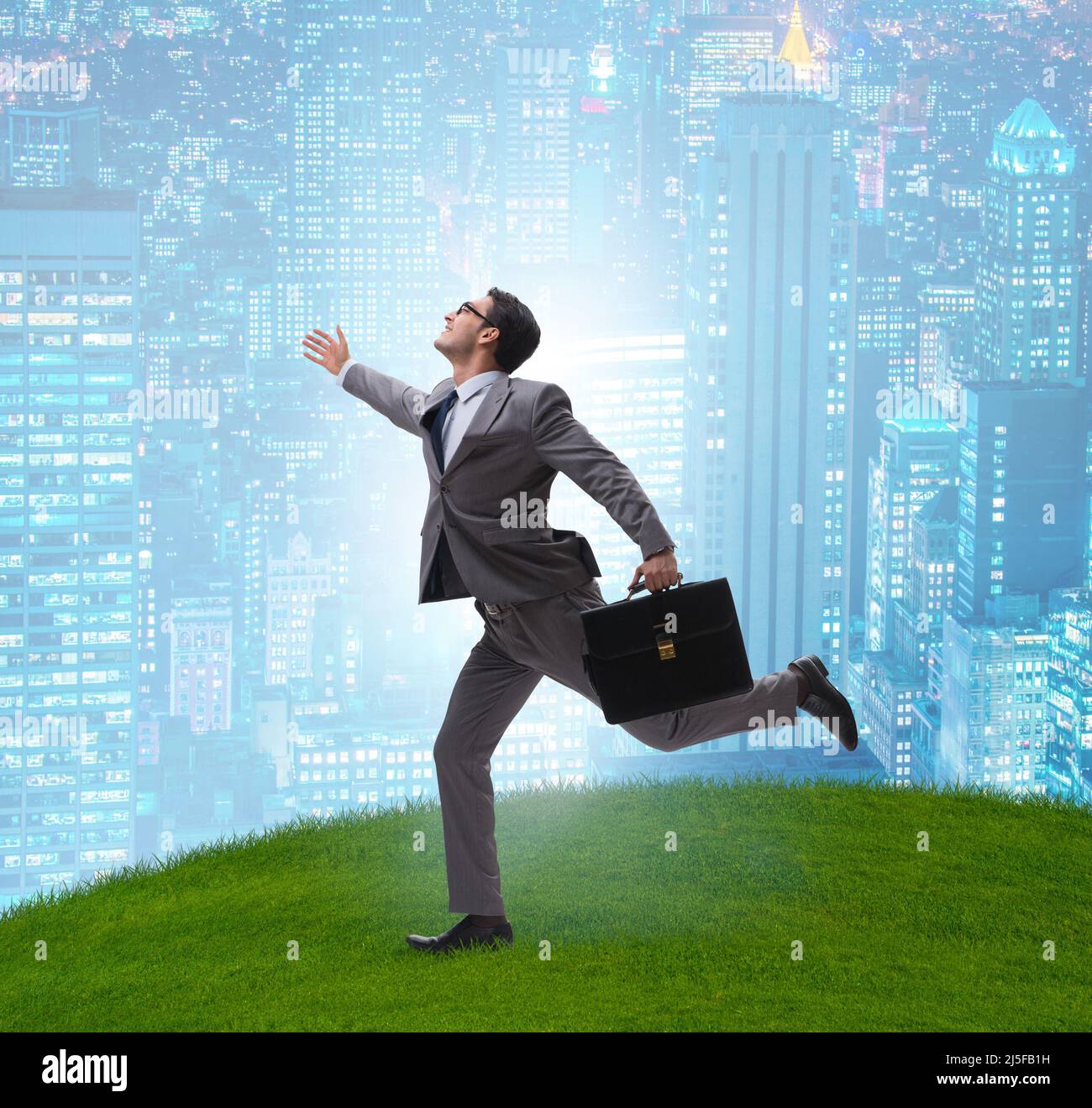 The happy businessman running towards his goal Stock Photo - Alamy