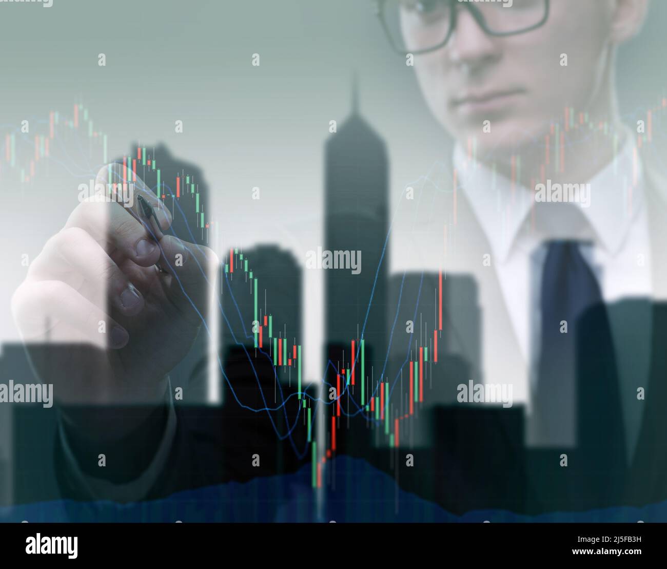 The man pressing buttons on line chart Stock Photo - Alamy