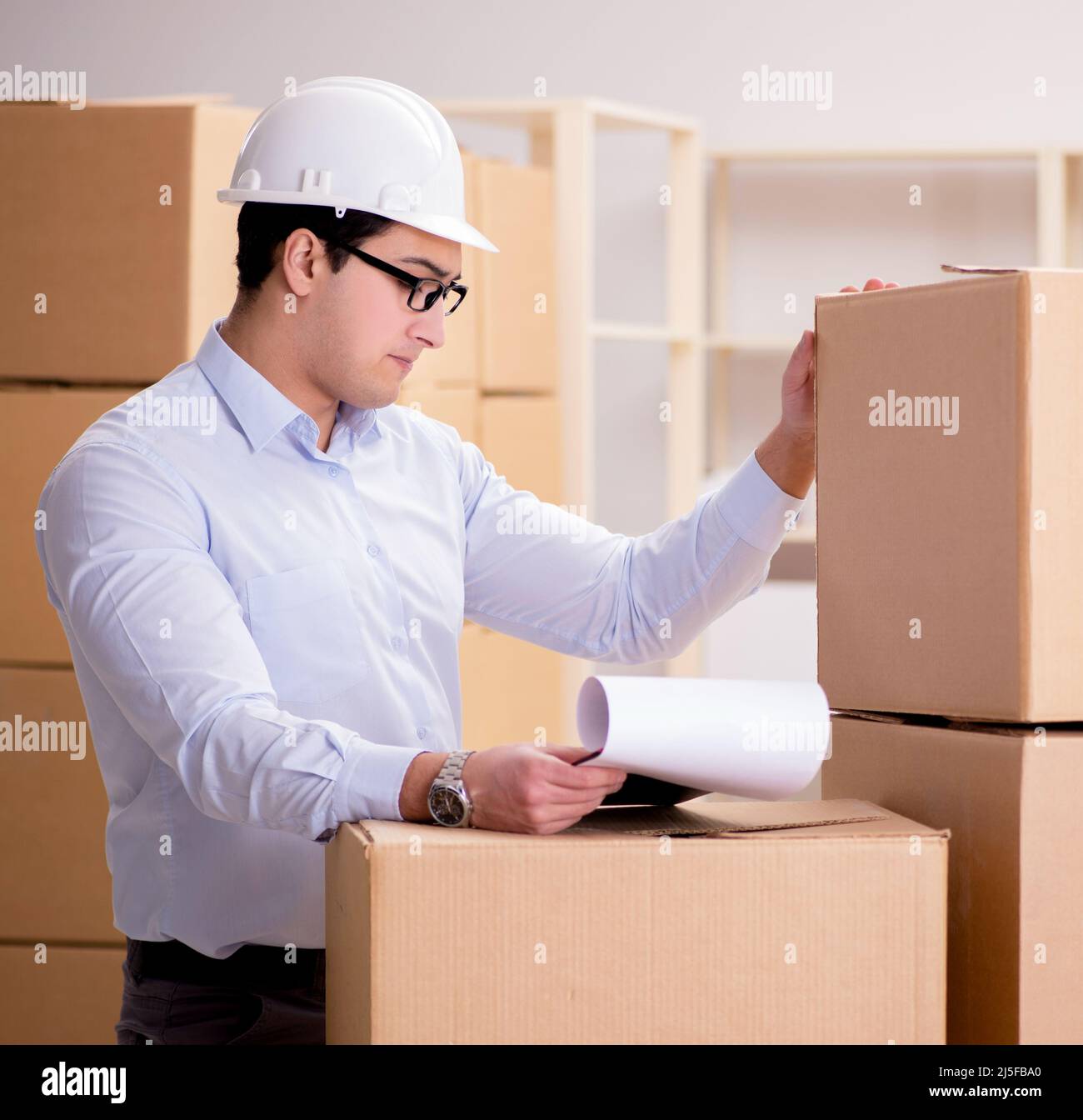 The man working in box delivery relocation service Stock Photo - Alamy