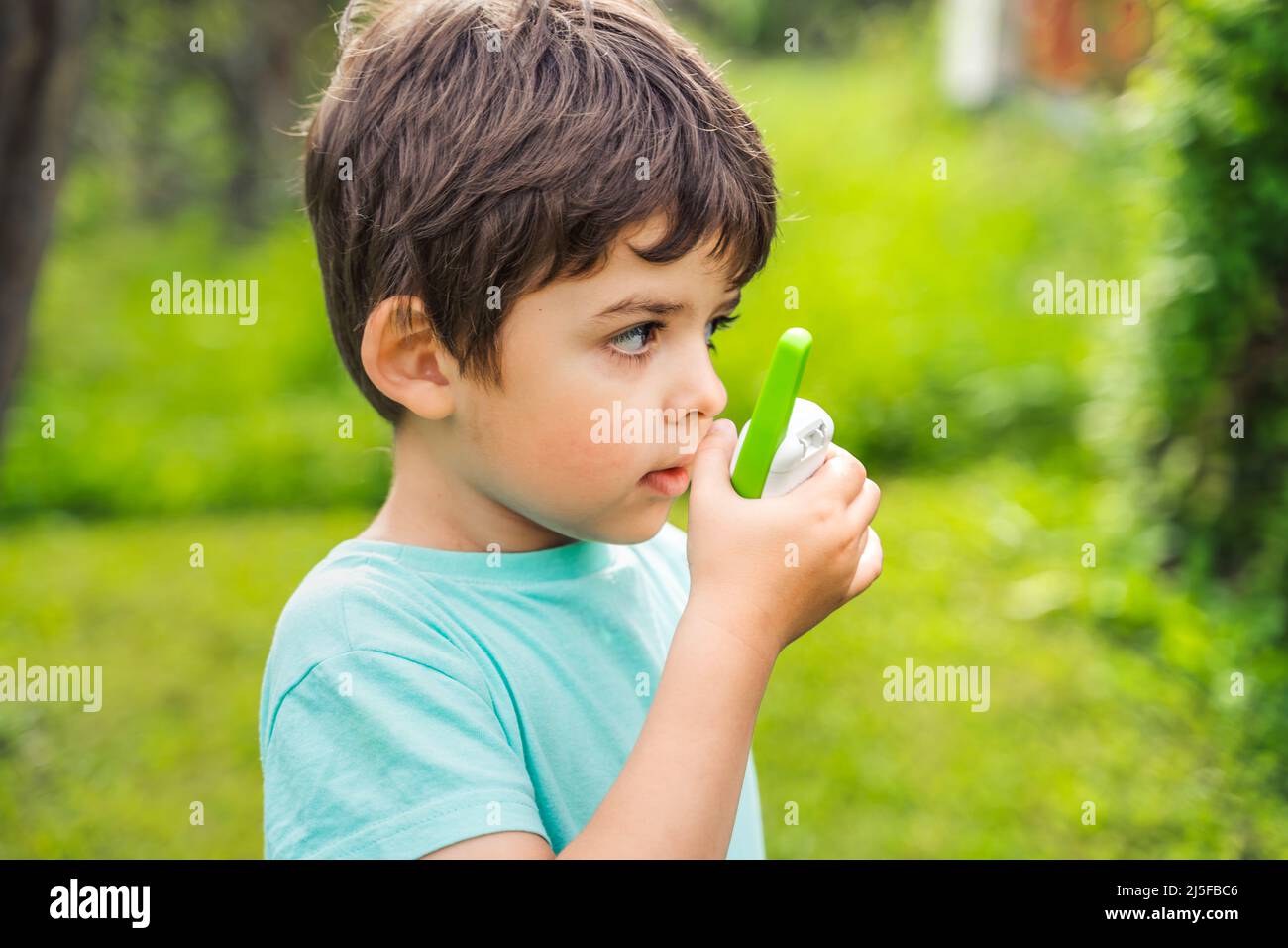 Small boy,kid,child play in walkie-talkie.Walkie Talkies with channels ...