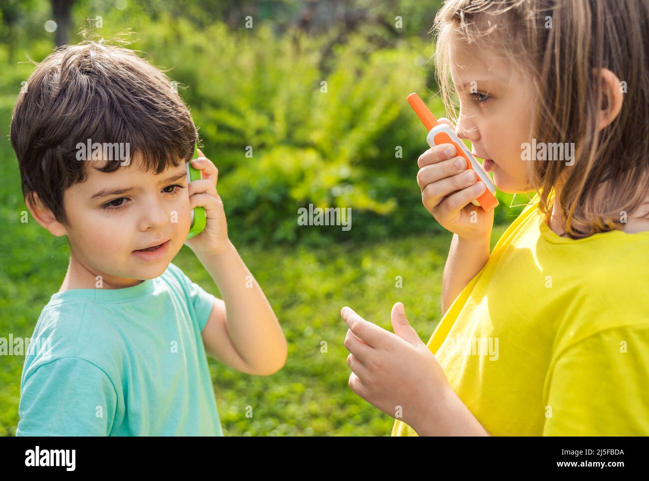 Small kids,girls play in walkie-talkie.Walkie Talkies with channels ...