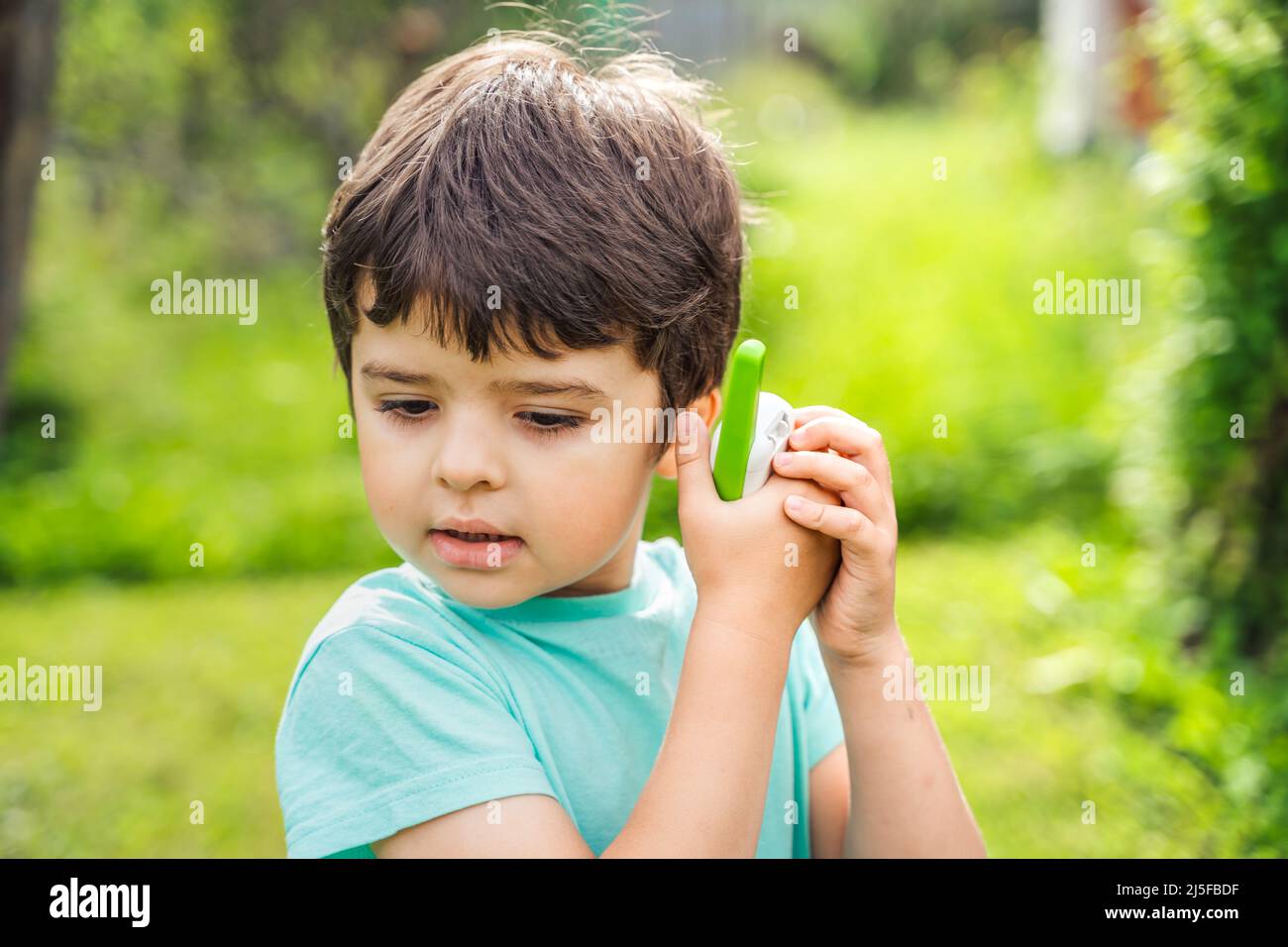 Small boy,kid,child play in walkie-talkie.Walkie Talkies with channels ...