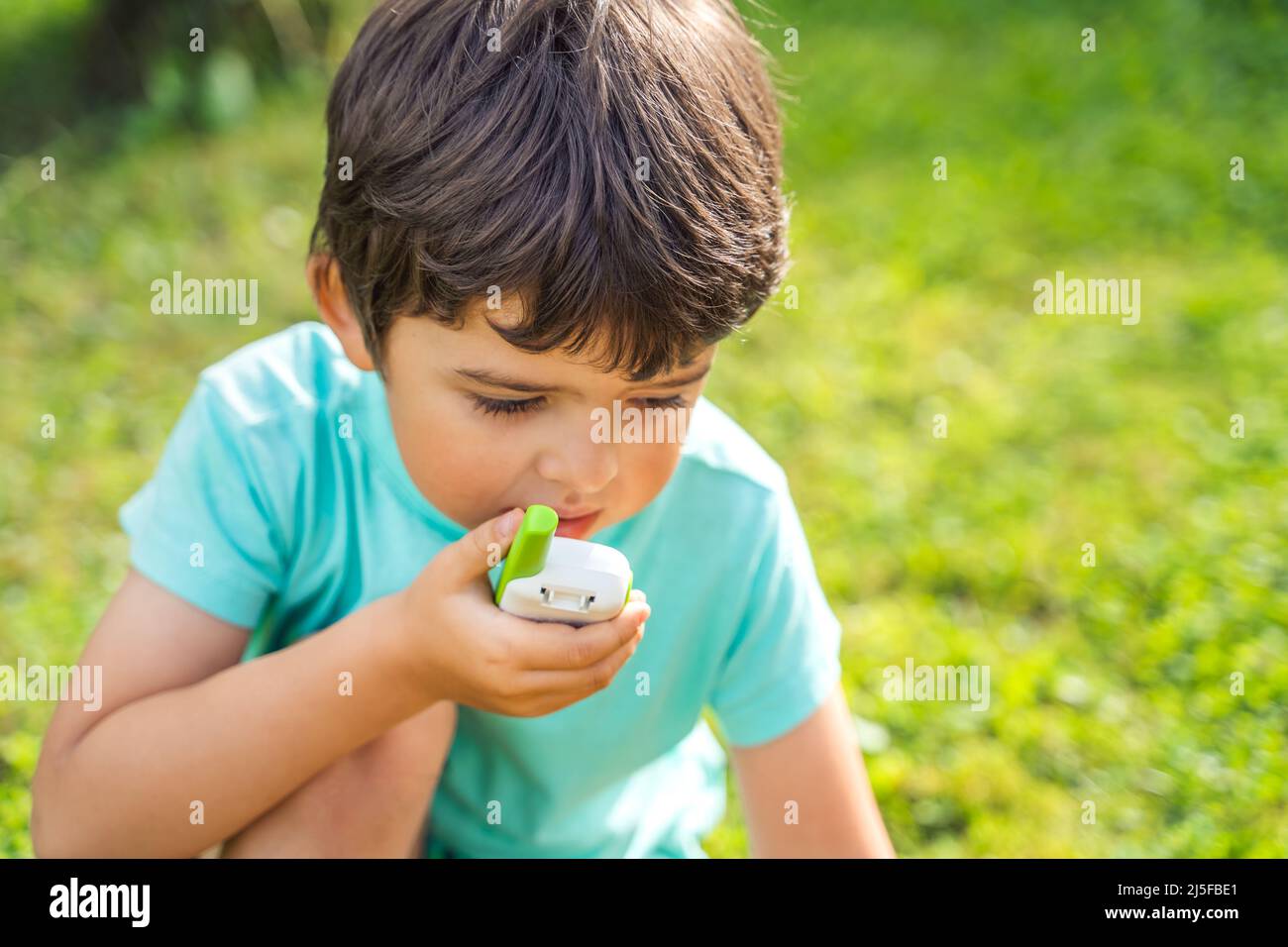 Small boy,kid,child play in walkie-talkie.Walkie Talkies with channels ...