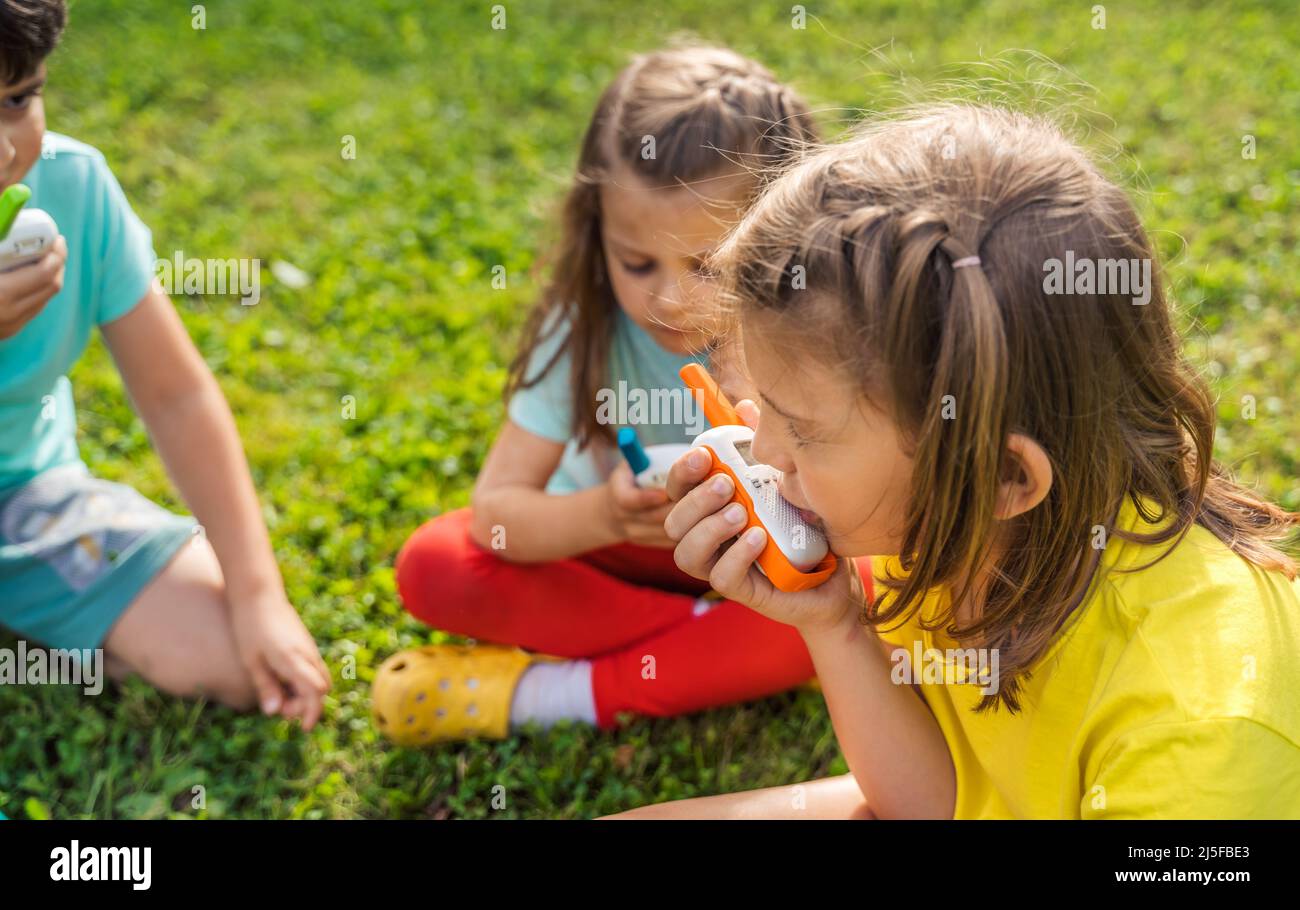 Small kids,girls play in walkie-talkie.Walkie Talkies with channels ...