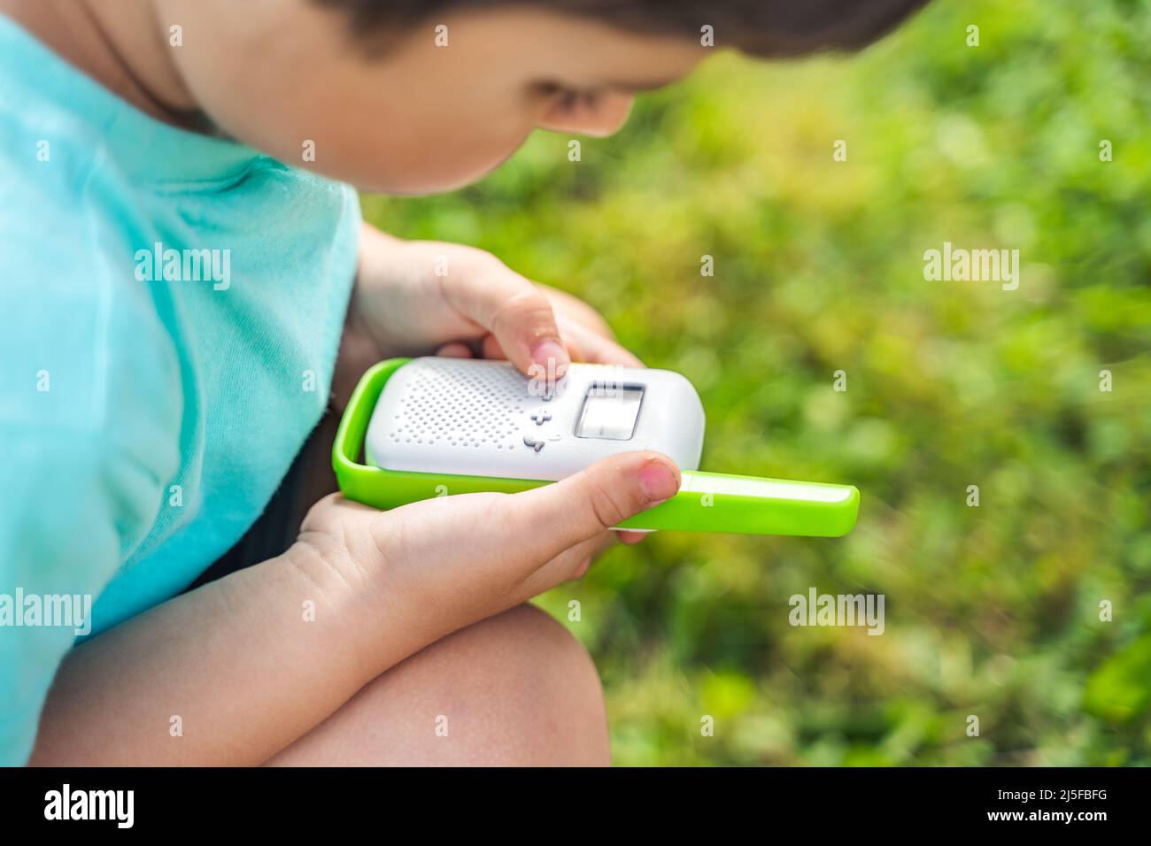 Small boy,kid,child play in walkie-talkie.Walkie Talkies with channels ...