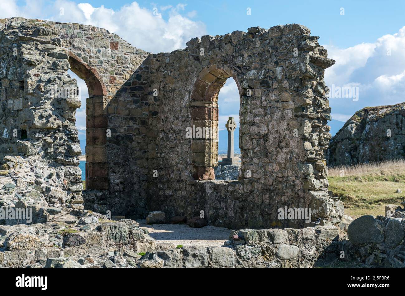 The ancient church ruins and monument, llanddwyn Island, Anglesey ...