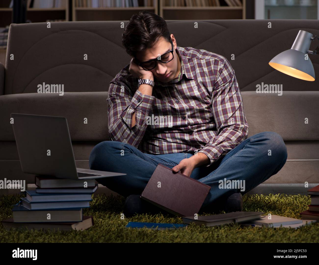 The student reading books preparing for exams Stock Photo - Alamy
