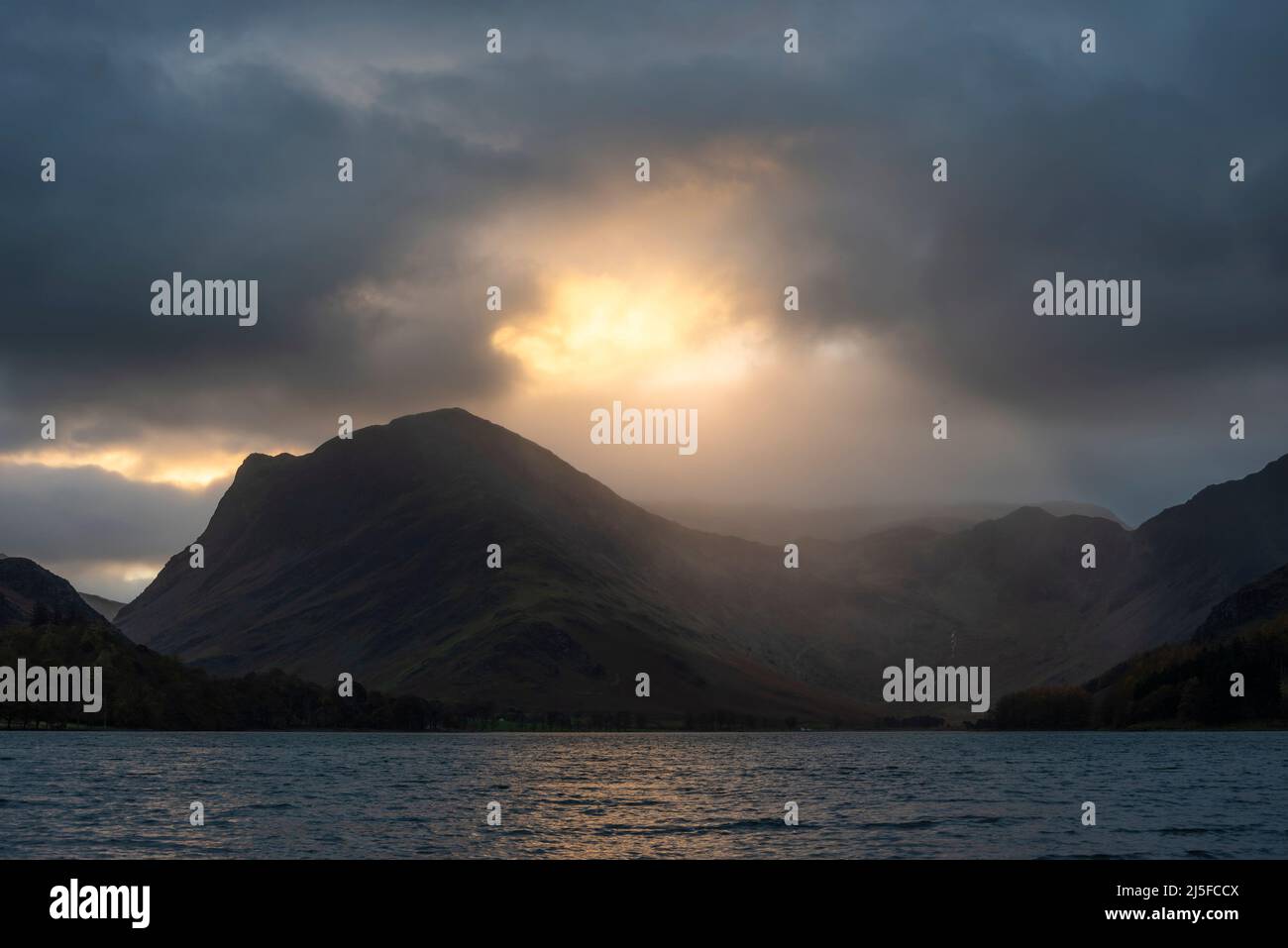 Stunning Autumn sunrise landscape image of Buttermere in Lake District ...