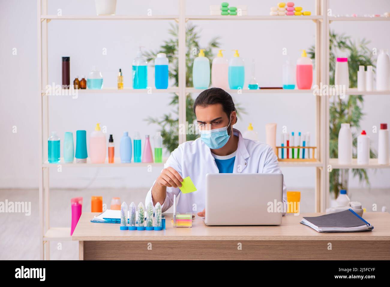 Young chemist testing soap in the lab Stock Photo - Alamy