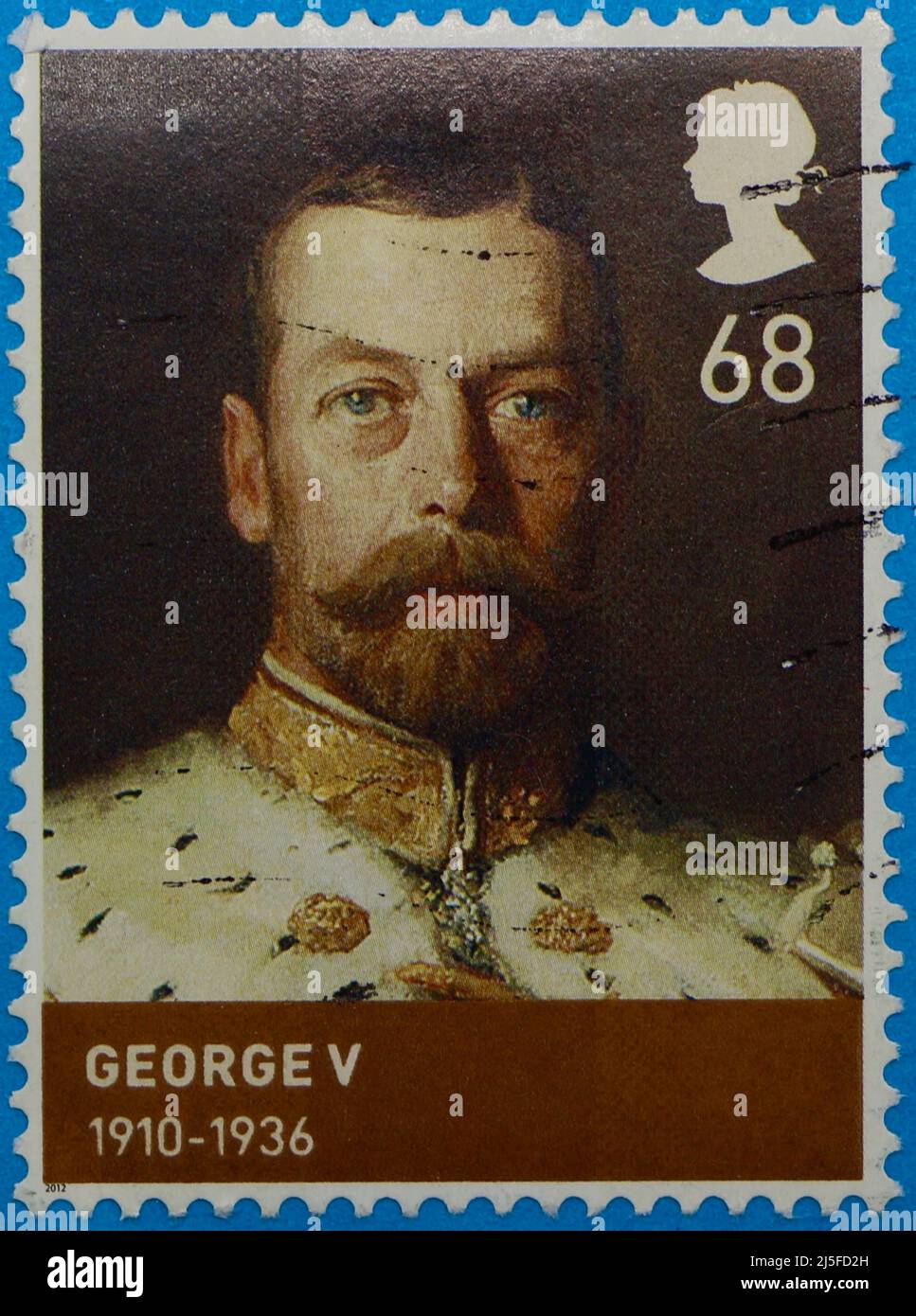 Photo of a stamp featuring a portrait painting of George V from the ...