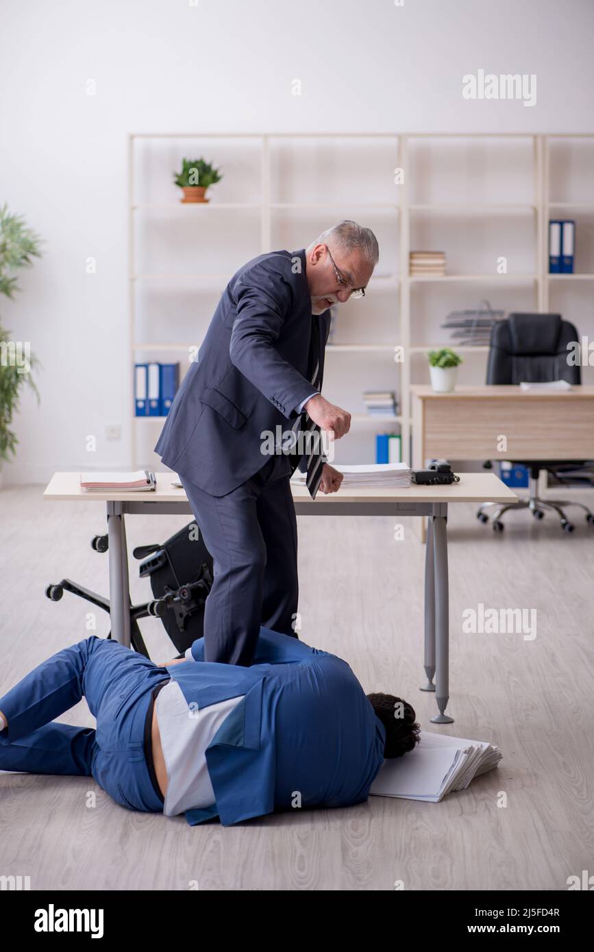 Old Boss And Young Employee In Bullying Concept Stock Photo Alamy old-boss-and-young-employee-in-bullying-concept-stock-photo-alamy