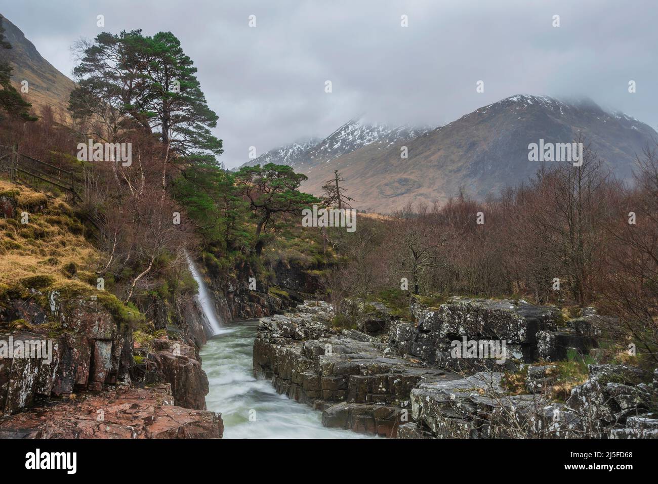 Beautiful Winter landscape image of River Etive and Skyfall Etive ...
