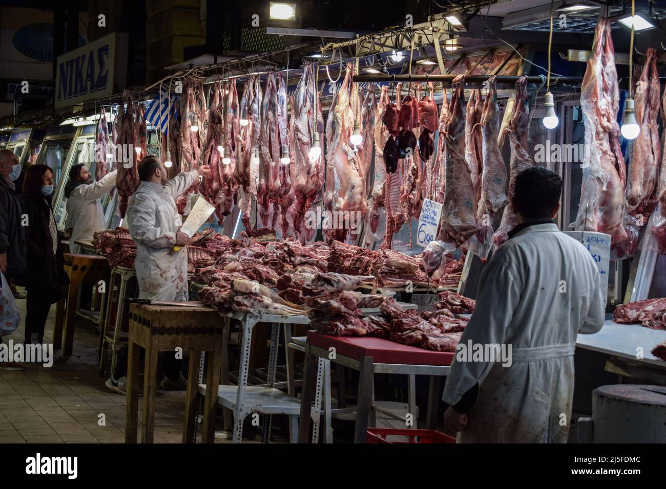 Athens, Greece. 21st Apr, 2022. Whole slaughtered lambs and goats are ...