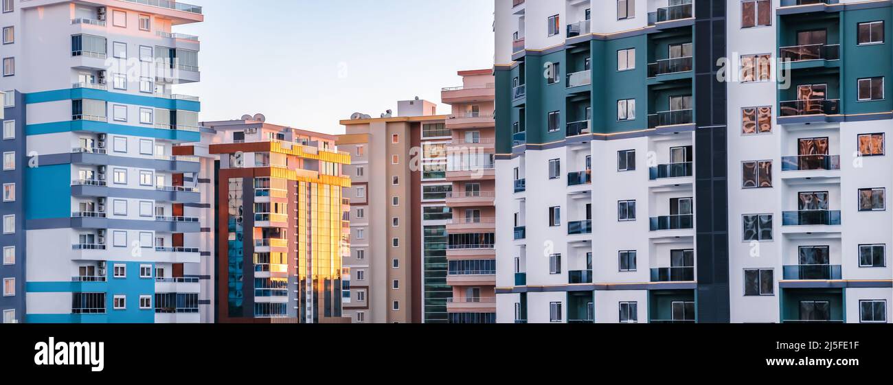 Fragments of facades of modern multi-storey residential buildings, side ...