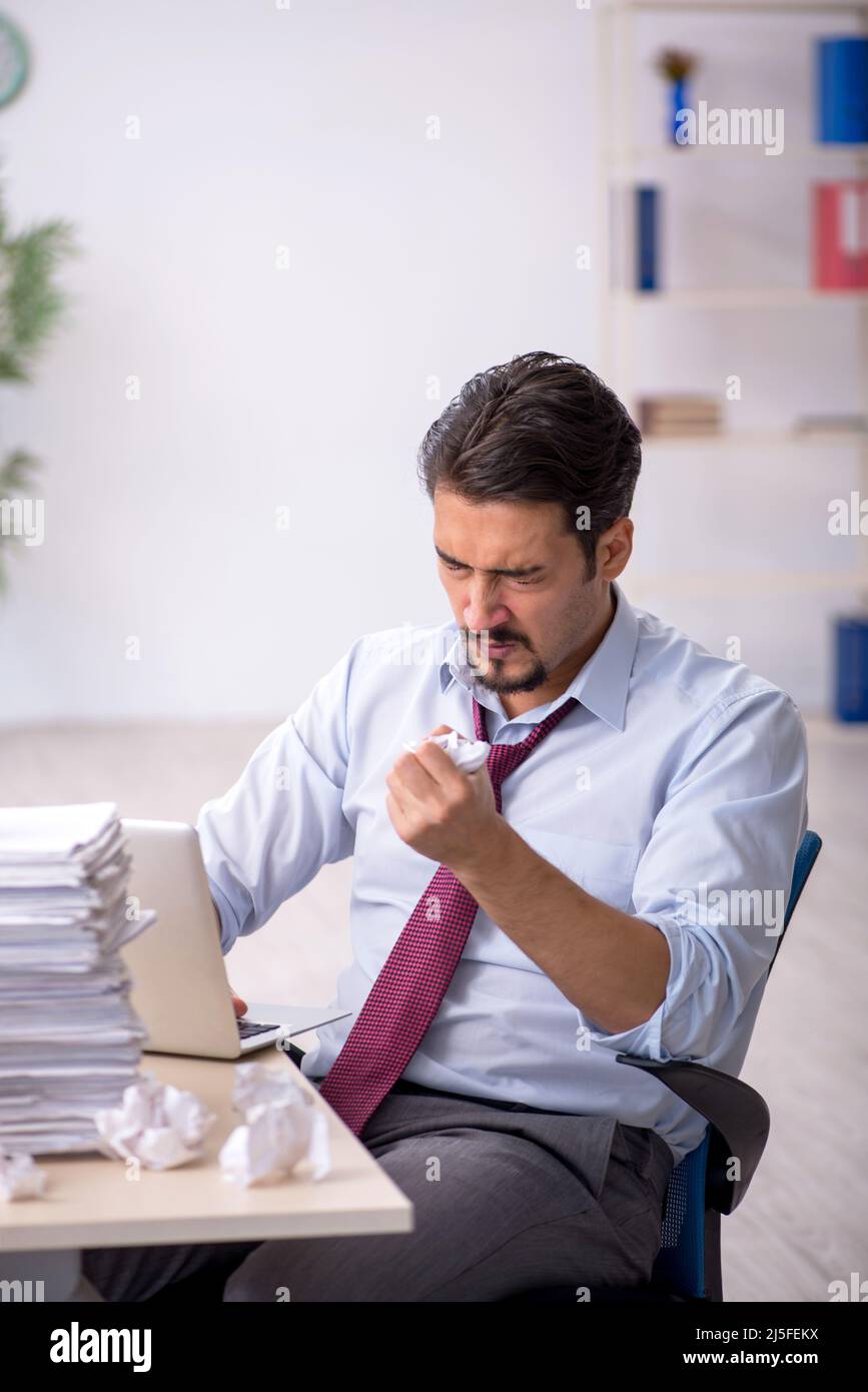 Young businessman employee in rejected ideas concept Stock Photo - Alamy