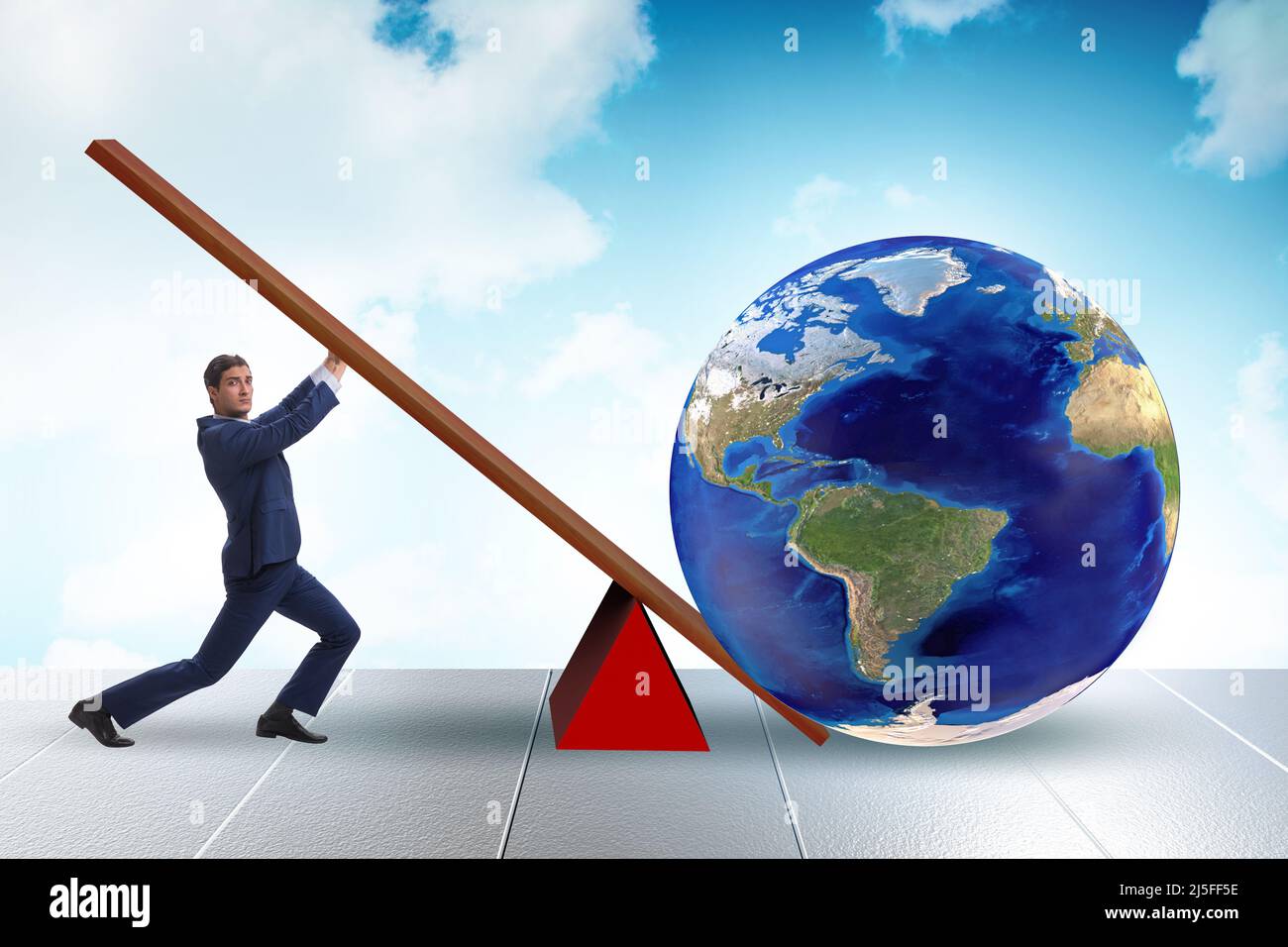 Businessman lifting the earth in the challenge concept Stock Photo - Alamy