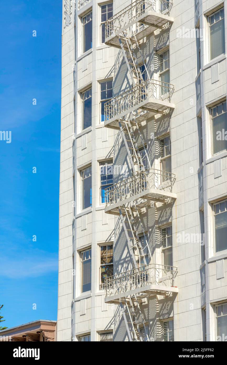 Emergency stairs outside the white multi-storey building at San ...