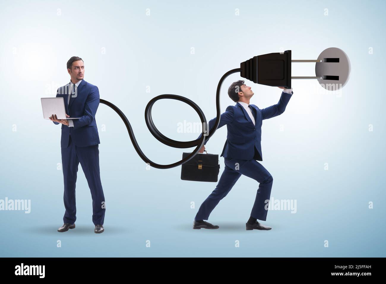 Businessman being powered by the electric power Stock Photo - Alamy