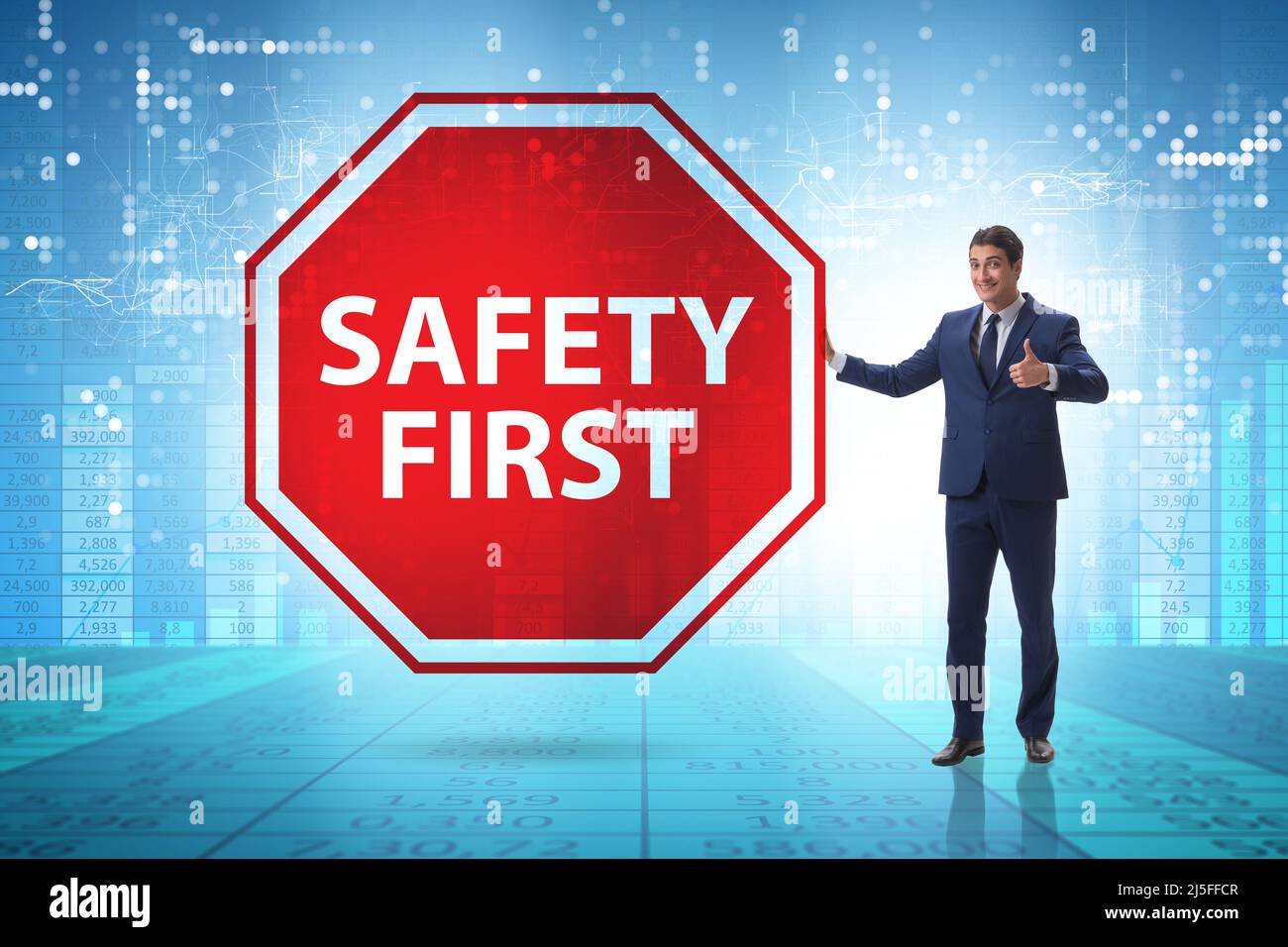 Safety first concept with the businessman Stock Photo - Alamy