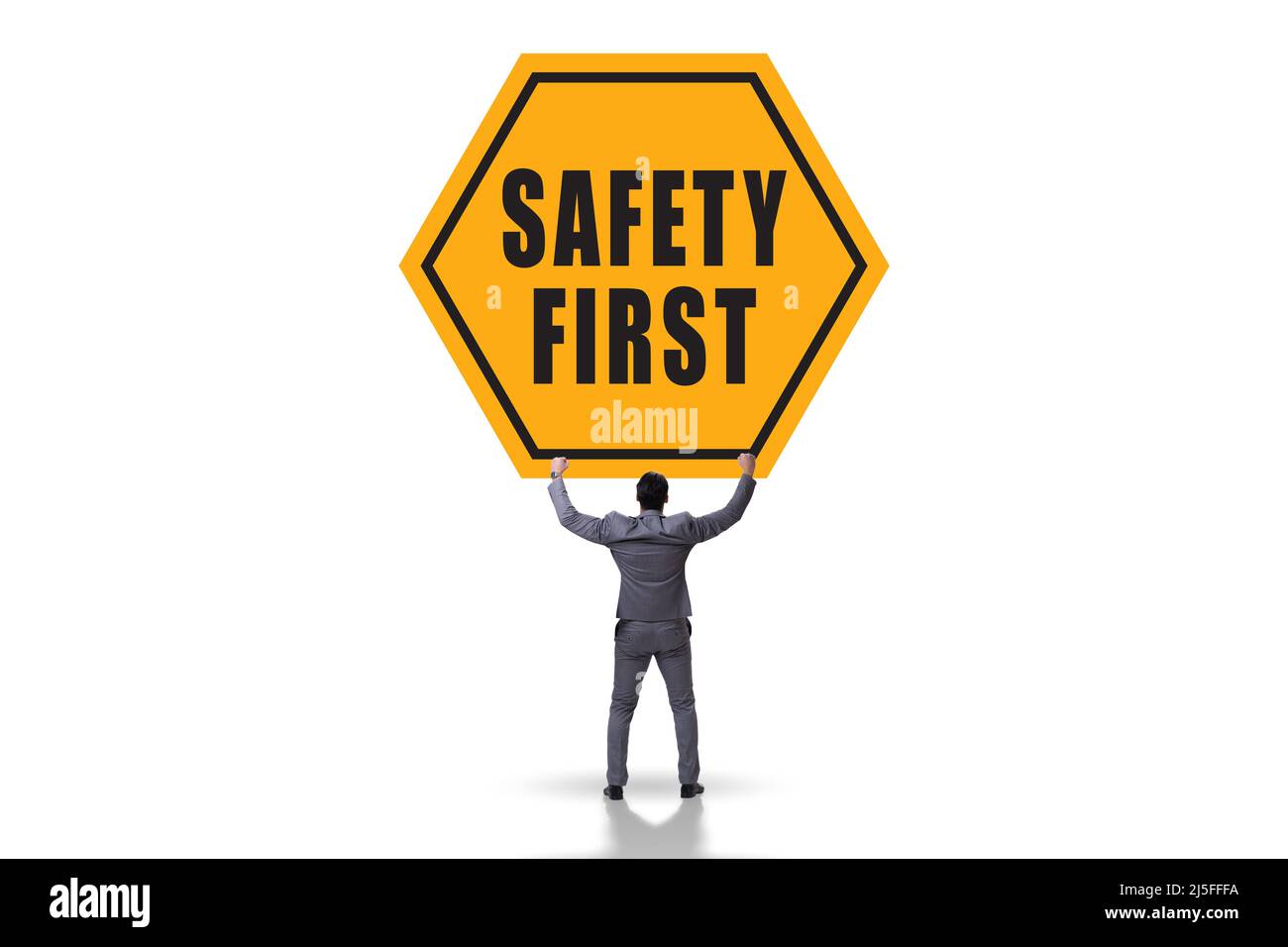 Safety first concept with the businessman Stock Photo - Alamy