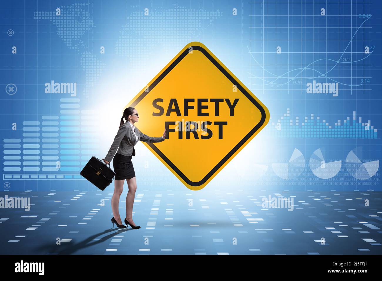Safety first badge with the business people Stock Photo - Alamy