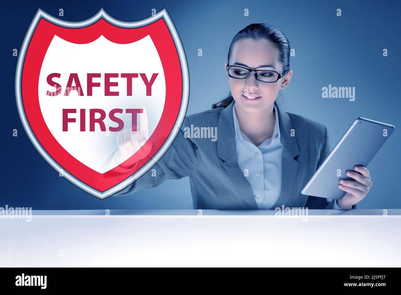 Safety first concept with the businesswoman Stock Photo - Alamy