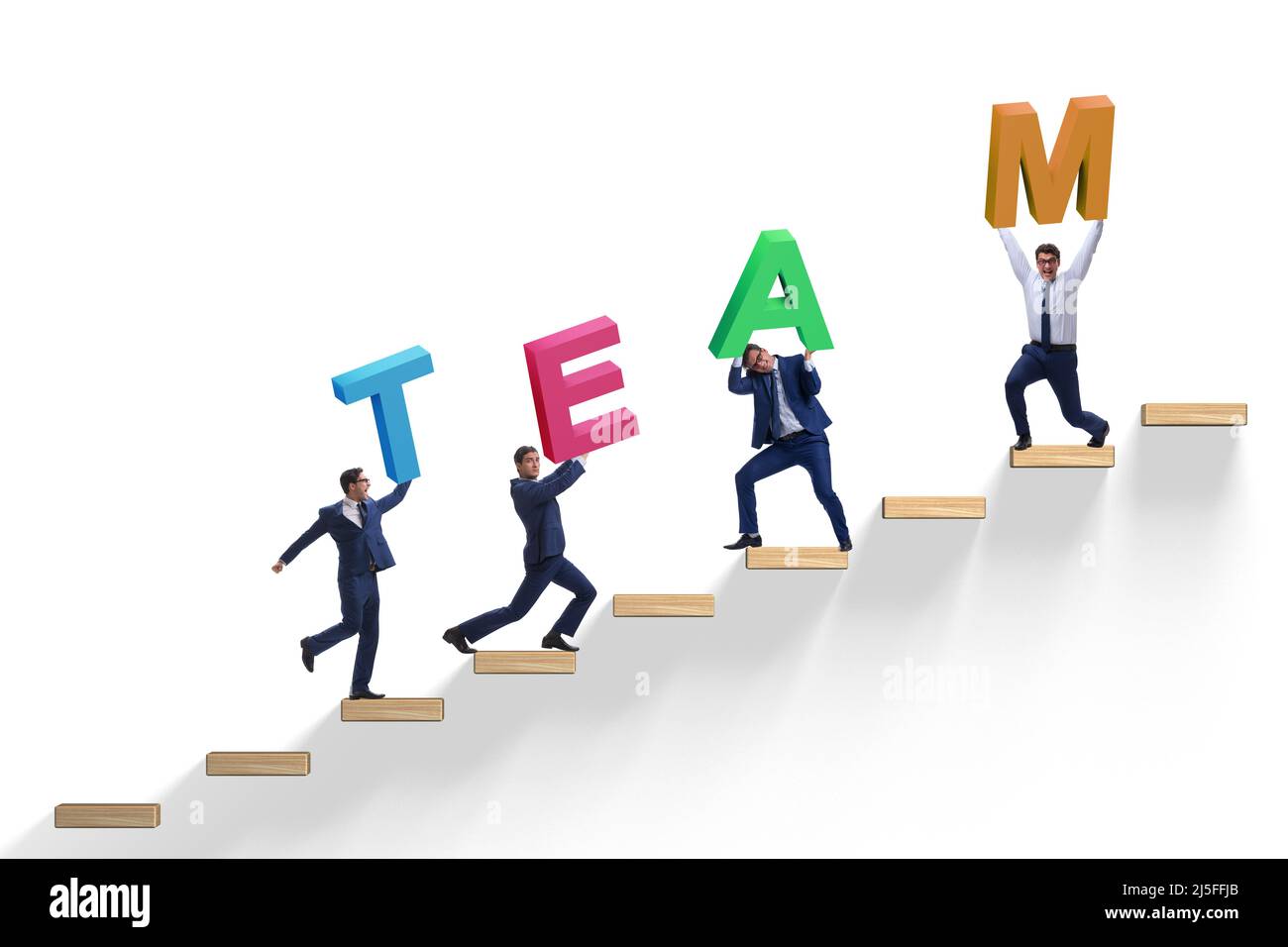 Teamwork concept with the people carrying team letters Stock Photo - Alamy