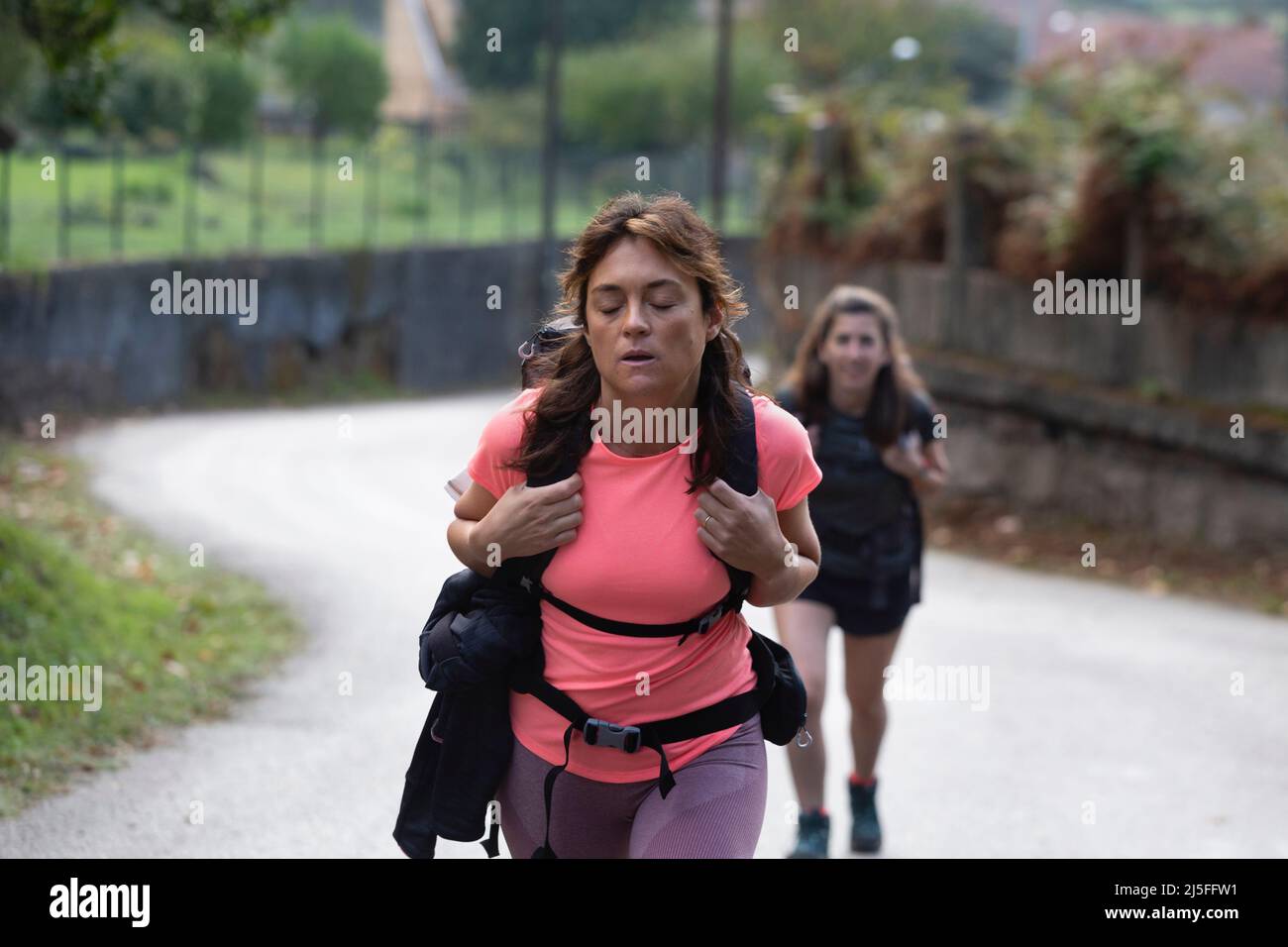 Two pilgrims on the Portuguese Camino de Santiago in O Viso, Redondela ...
