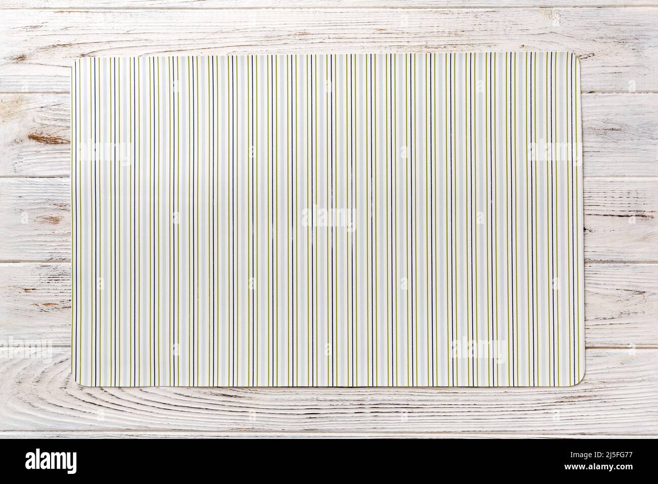 Top view of light tablecloth for food on wooden background. Empty space ...